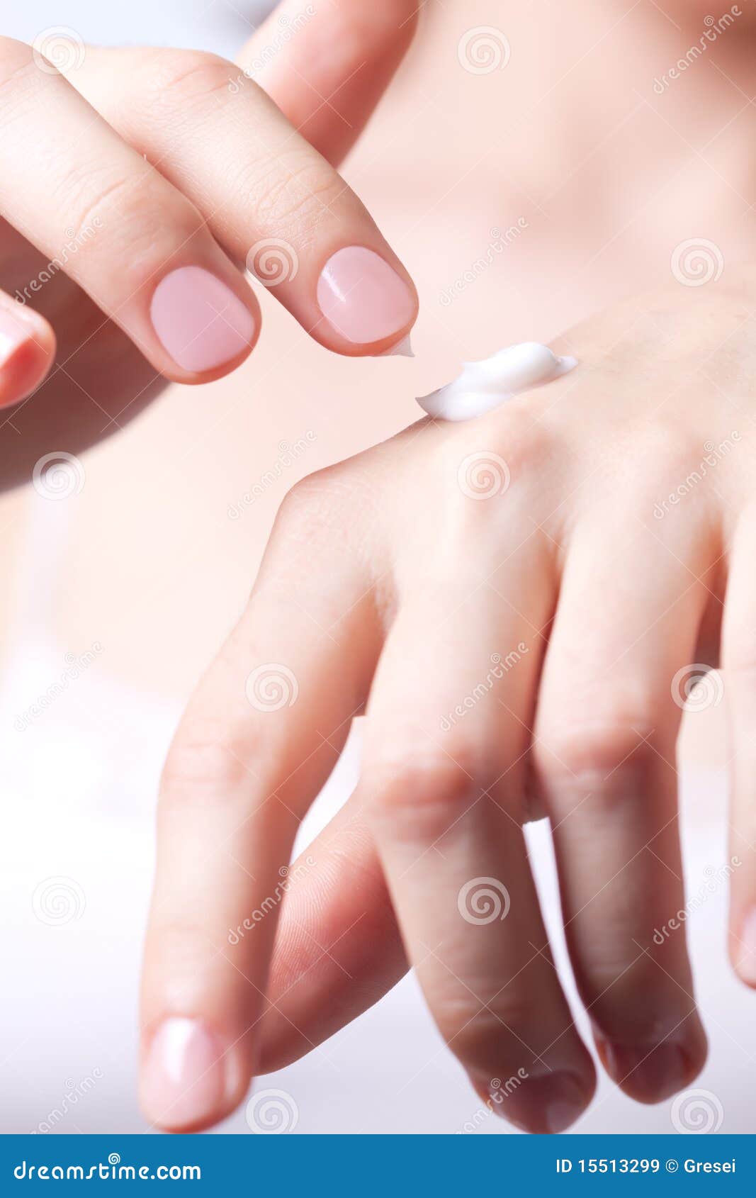 Cream on the women hand stock image. Image of female - 15513299