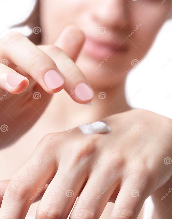 Cream on the women hand stock photo. Image of applying - 16341710