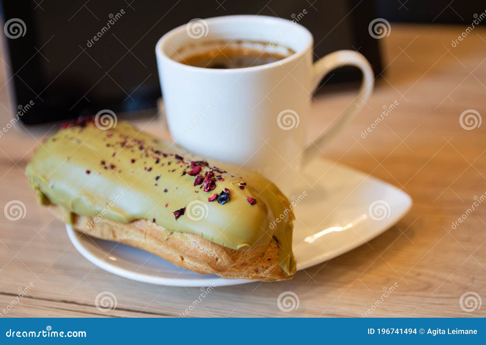 Creamy Eclair and Black Coffee Stock Photo - Image of coffe, creamy ...