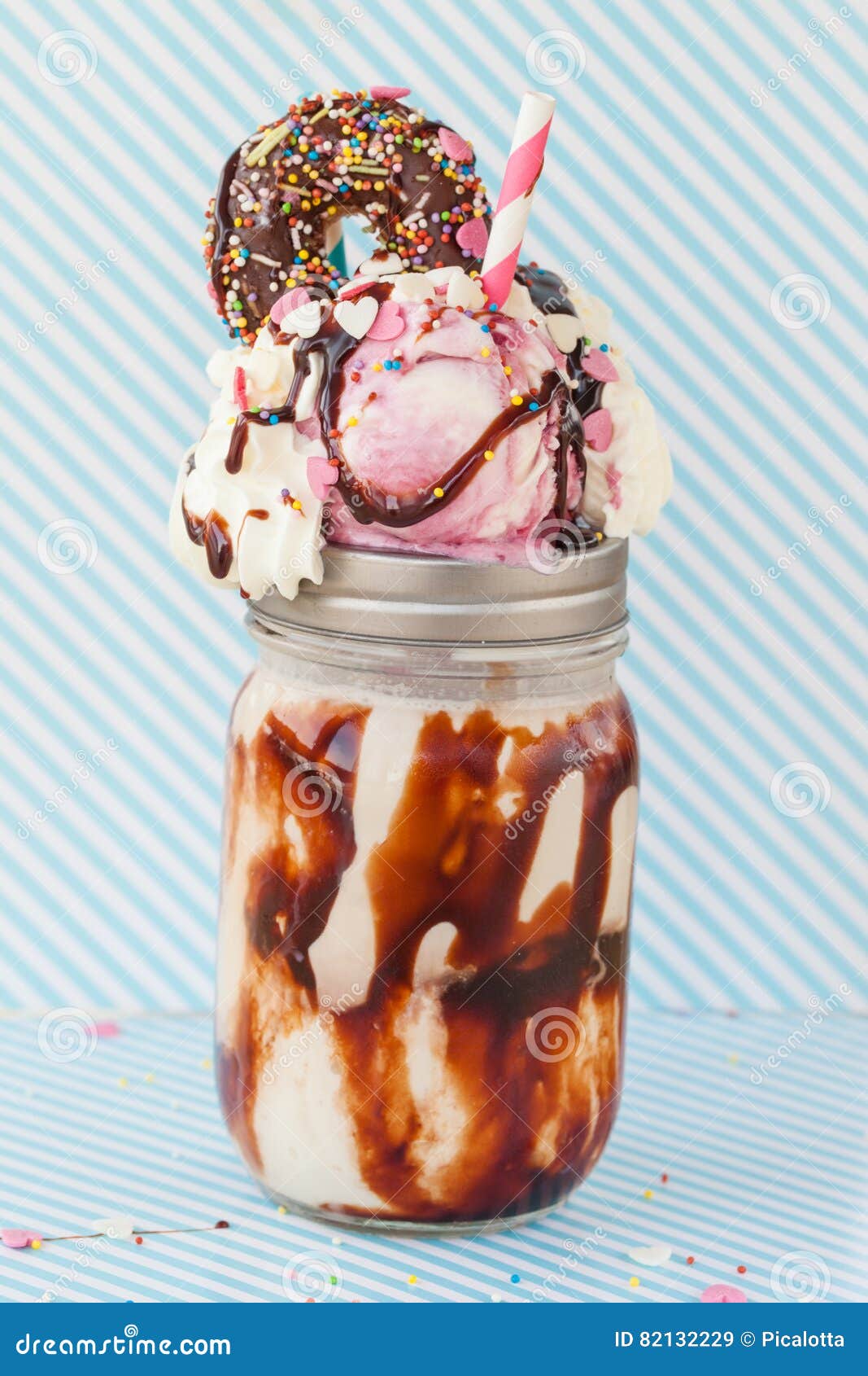 Creamy Overstuffed Milkshake Stock Image - Image of stripes, milkshake ...