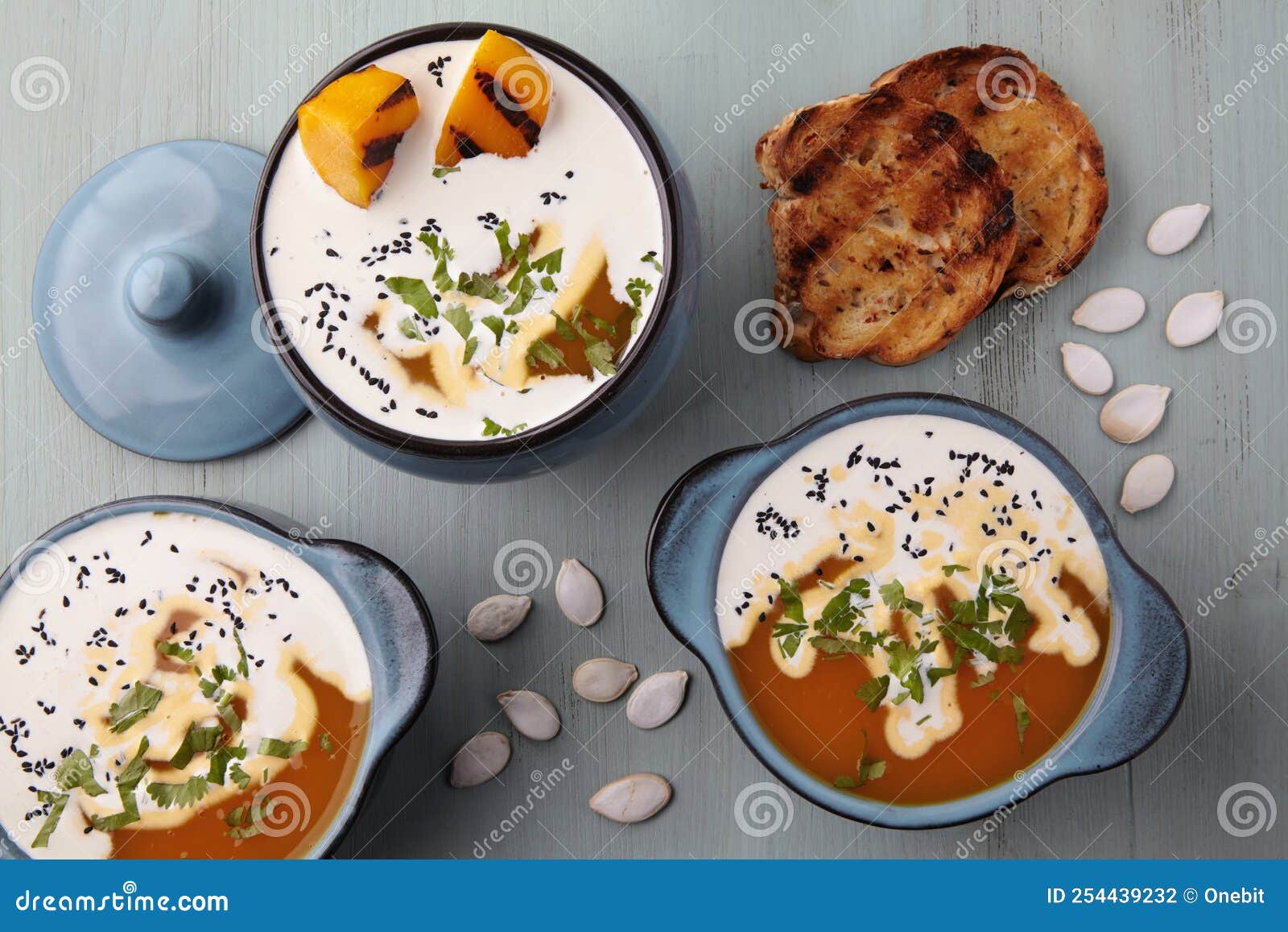 Creamy Pumpkin Soup With Cream Black Cumin Seeds Herbs Pumpkin Seeds