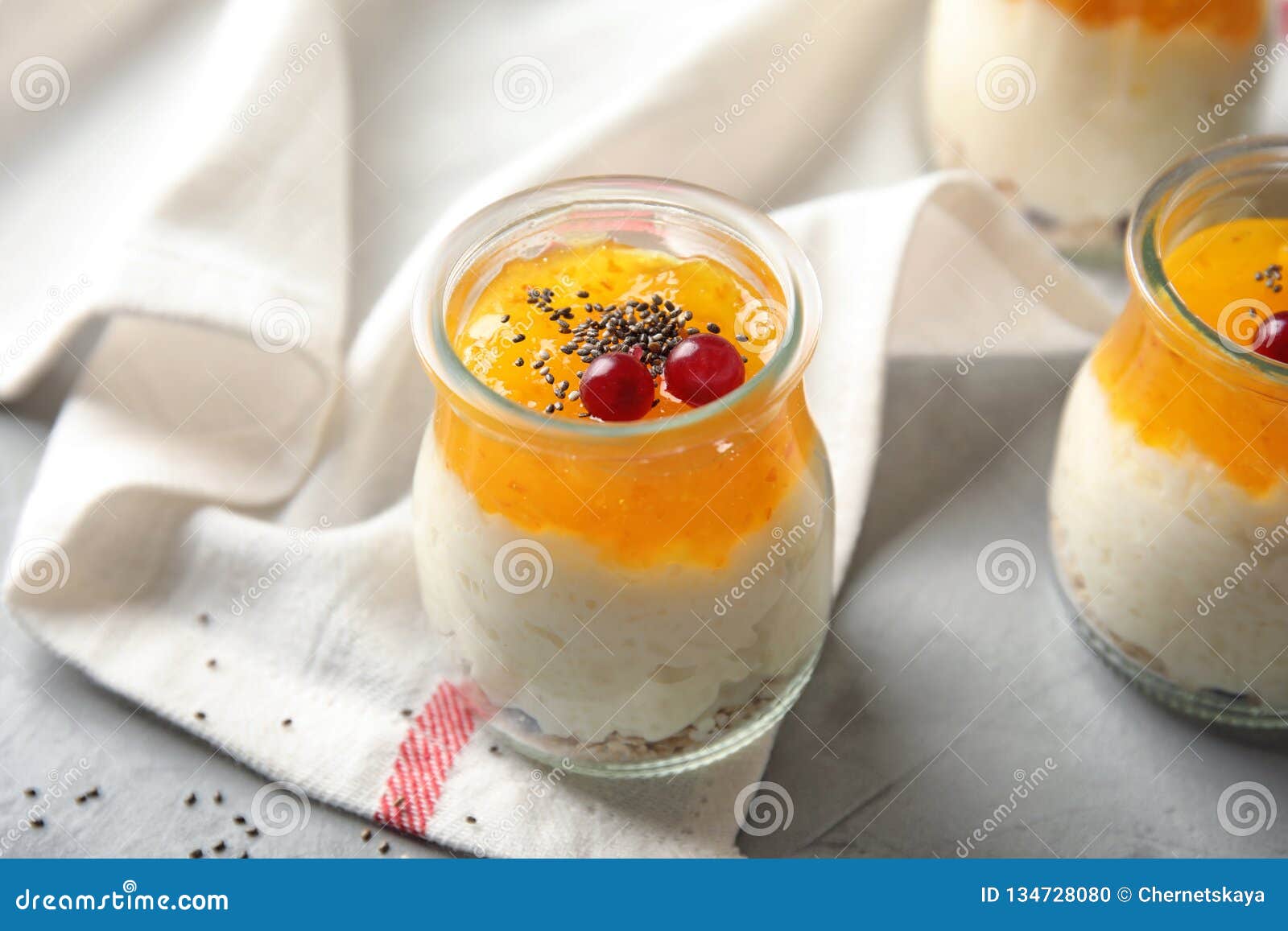 Creamy Rice Pudding with Red Currant, Jam and Oatmeal in Jars Stock ...