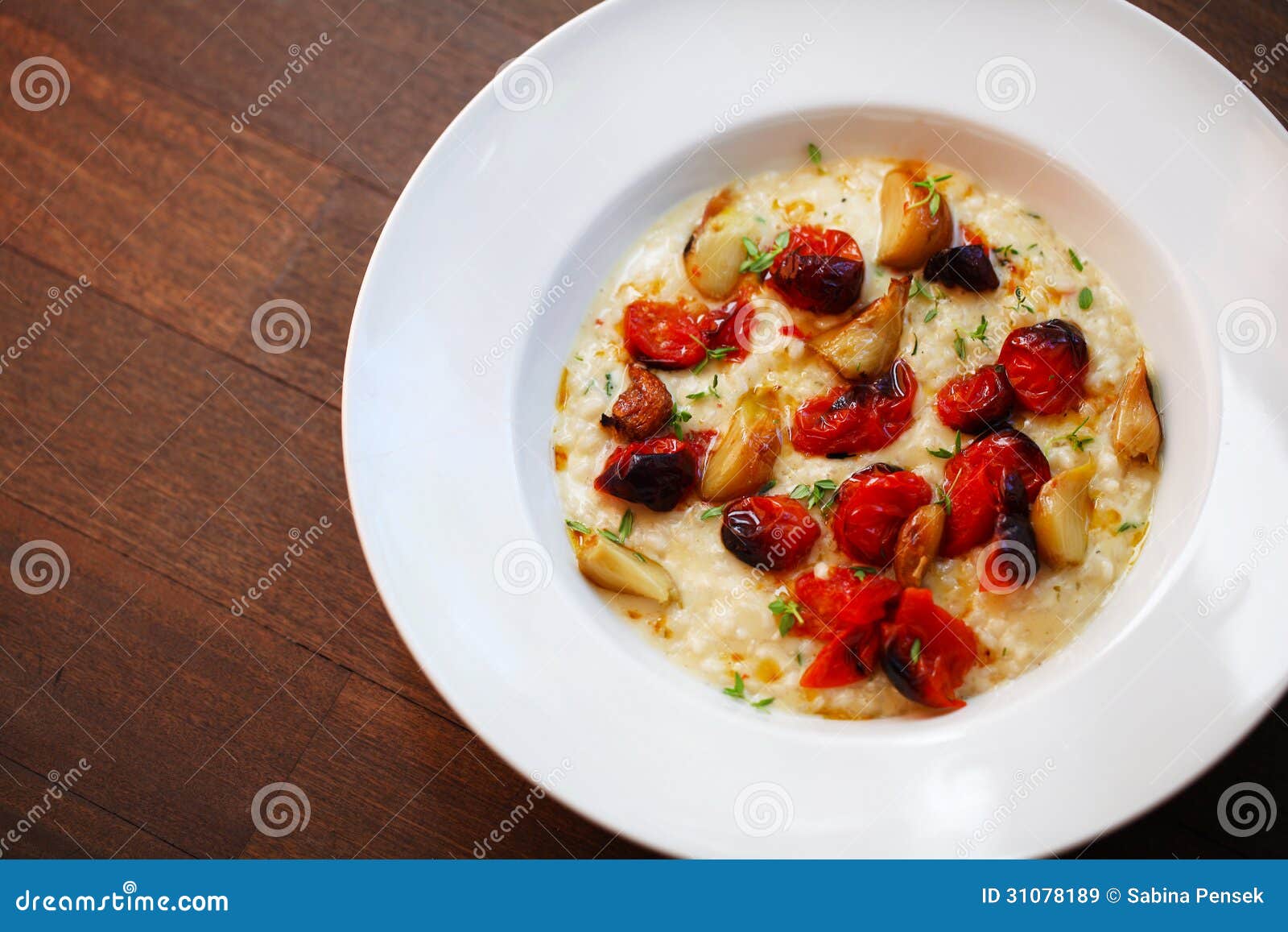 Creamy Risotto with Roasted Cherry Tomatoes and Garlic Stock Image ...