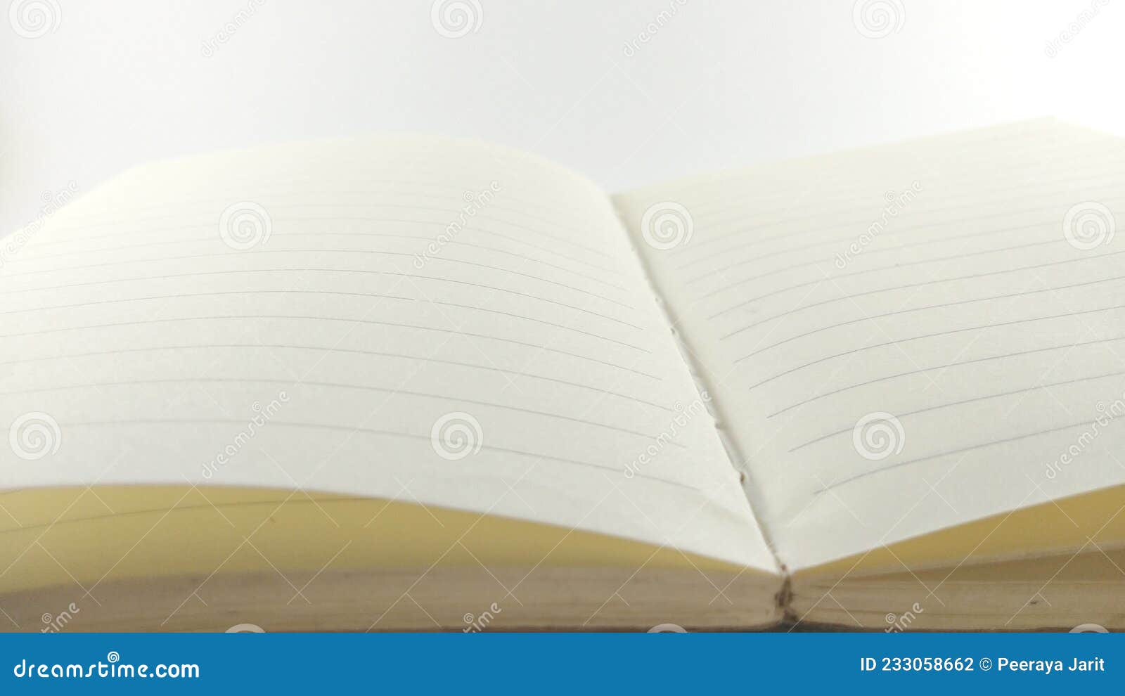 Creamy White Notebook Unfolded in the Middle Stock Photo - Image of ...