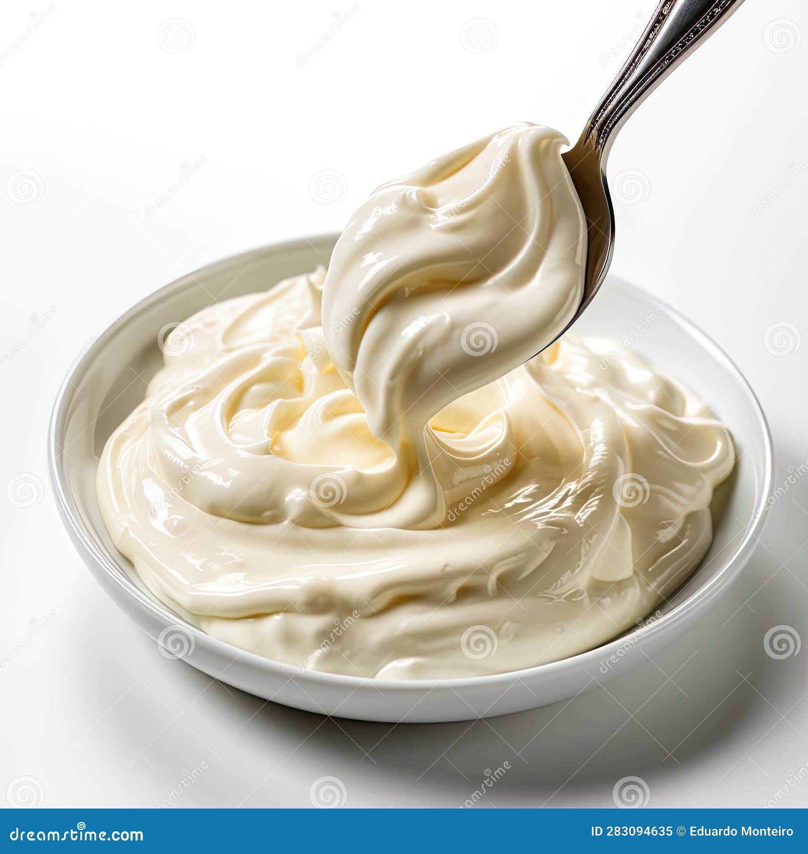 Creamy Yogurt Being Spooned from a Bowl, Displaying Layered Complexity ...