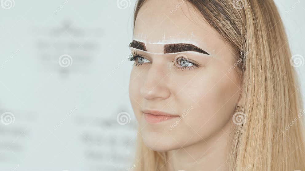 Create Permanent Eyebrow Makeup. Marking the Shape of the Eyebrows ...