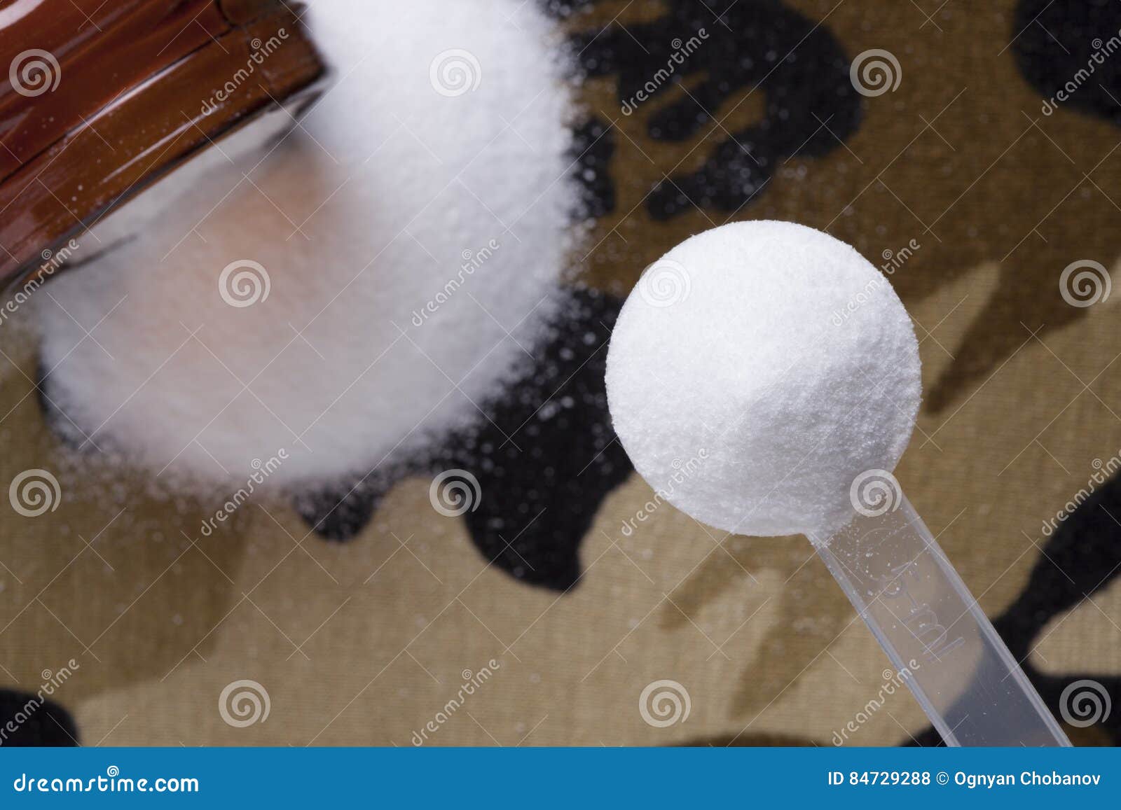 Creatine Micronized on a Camouflage Background Stock Photo - Image of ...