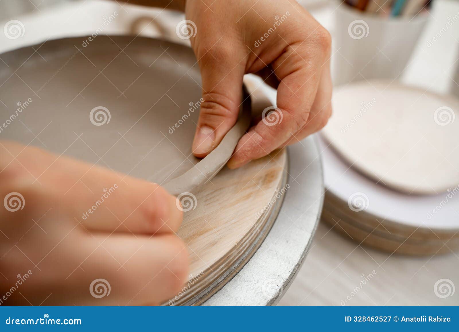 Creating Ceramic Products from Flat Sheets of Clay. Using Hands To ...