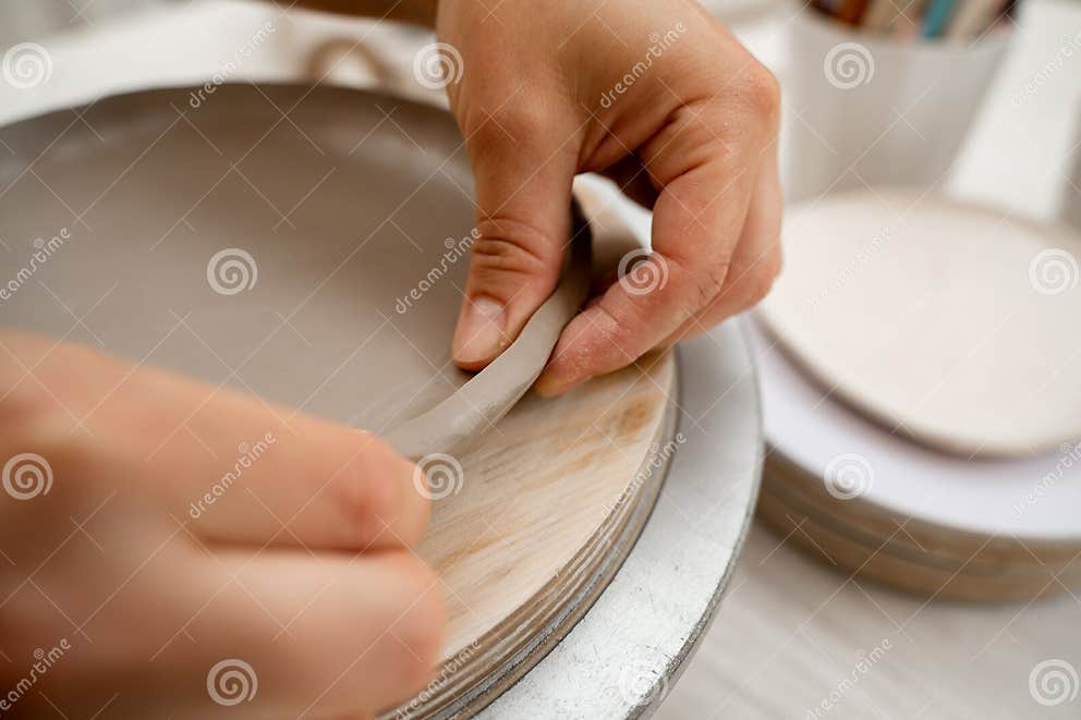 Creating Ceramic Products from Flat Sheets of Clay. Using Hands To ...