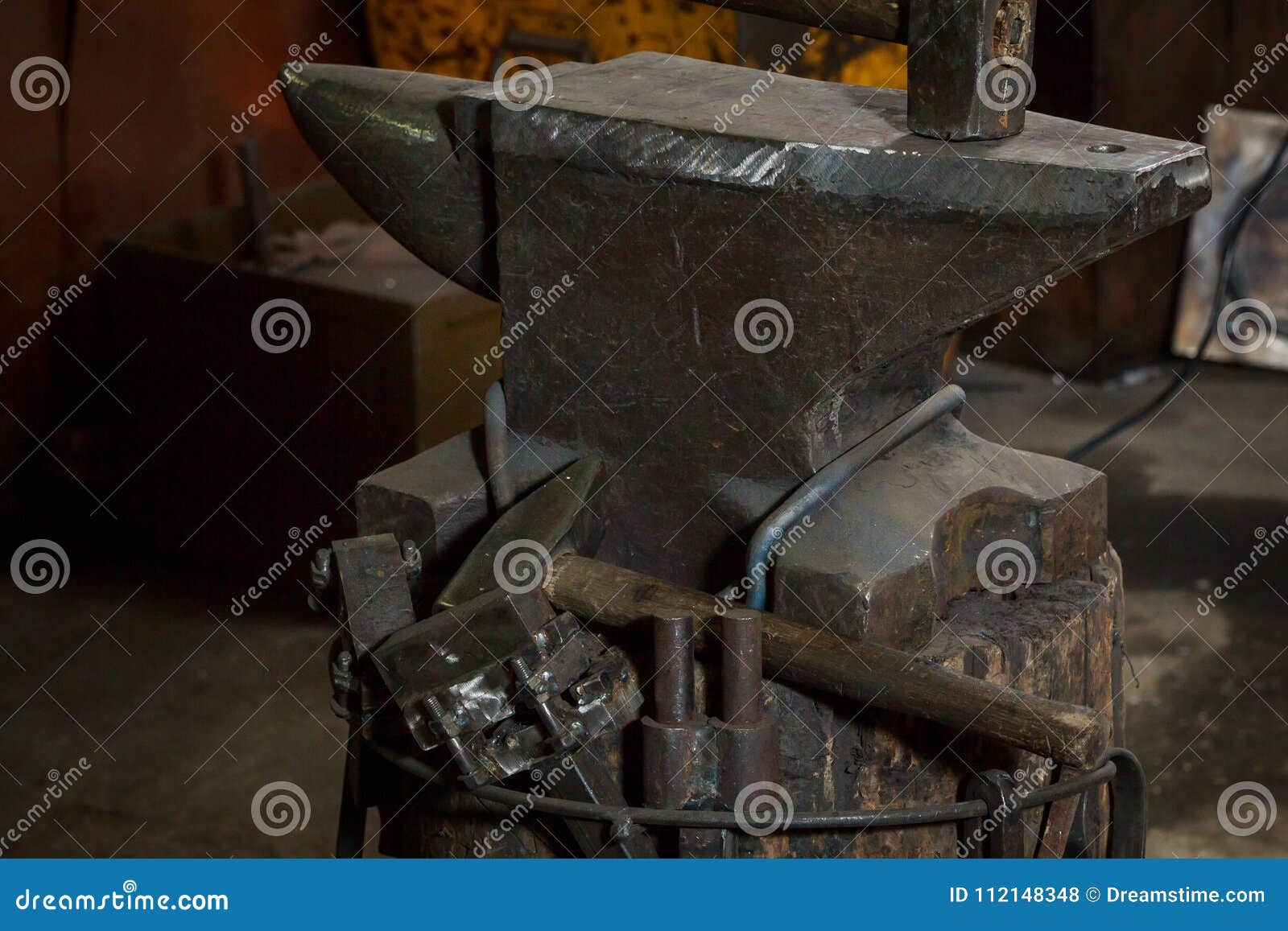 Creating Iron Tools in Blacksmith`s on the Old Plank Wood Table Stock ...