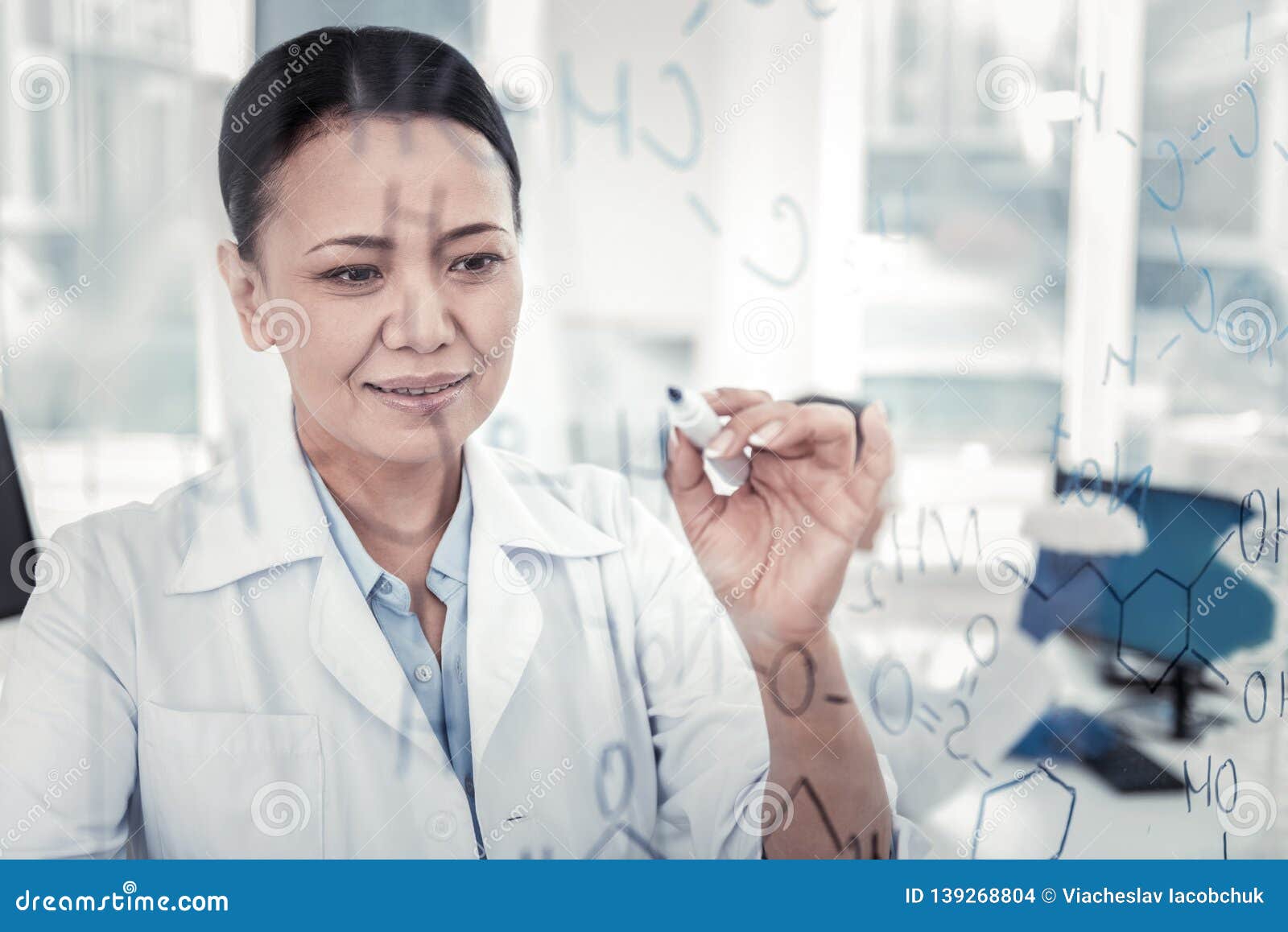 Concentrated Scientist Thinking on the New Formula Stock Photo - Image ...