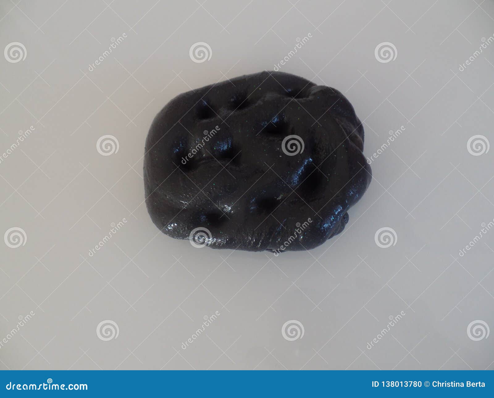 Creating Patterns with Black Slime Stock Photo - Image of slime ...