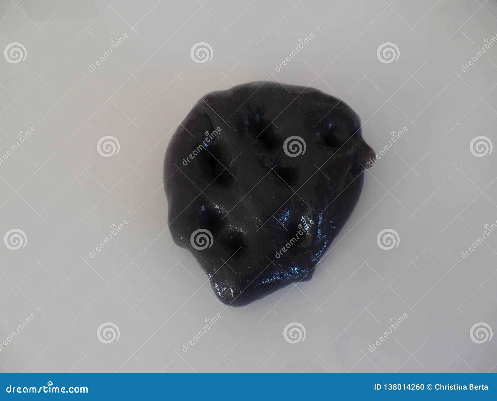 Creating Patterns with Black Slime Stock Photo - Image of hold, pastime ...