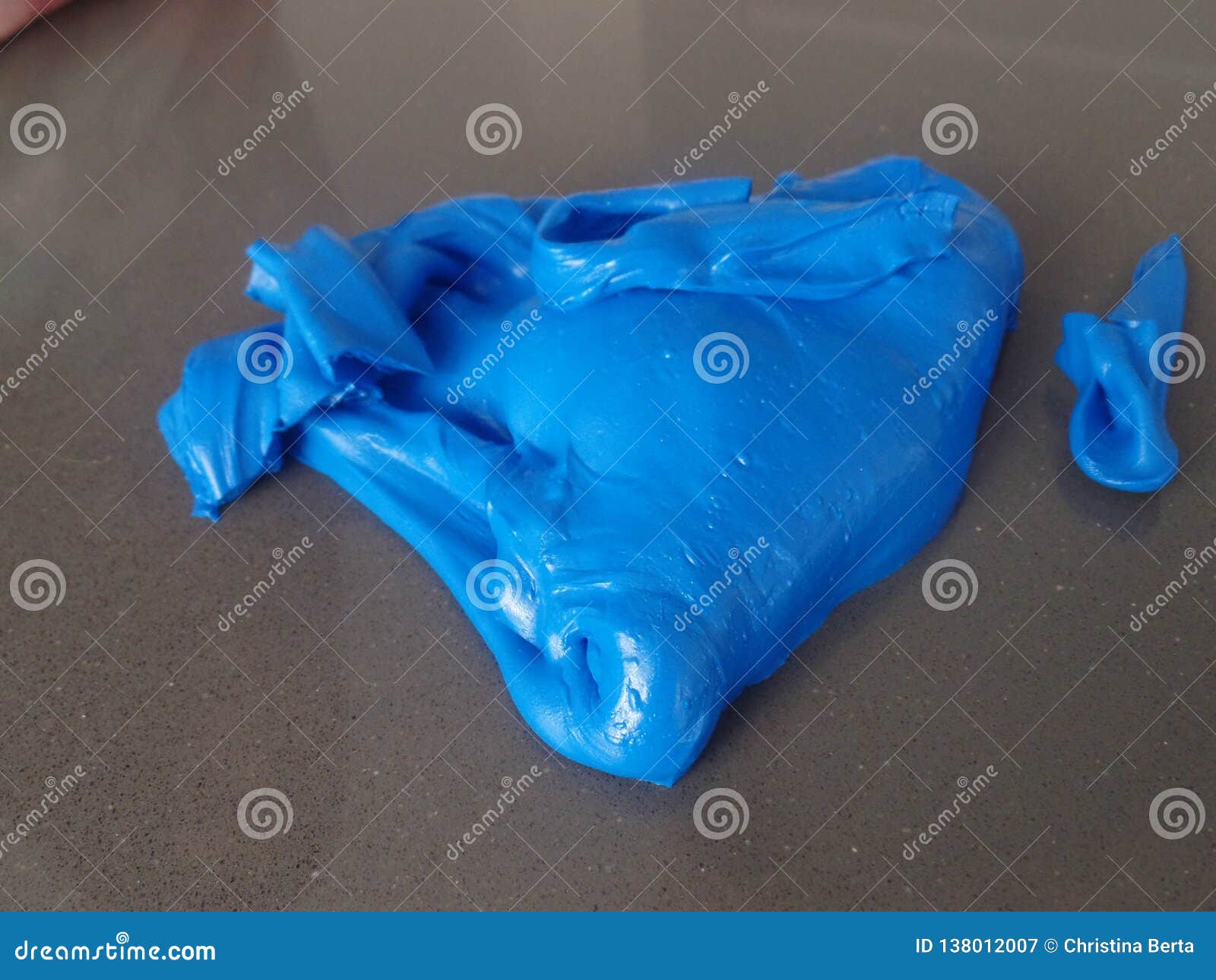 Creating Patterns with Blue Slime Stock Image - Image of foam, finger ...