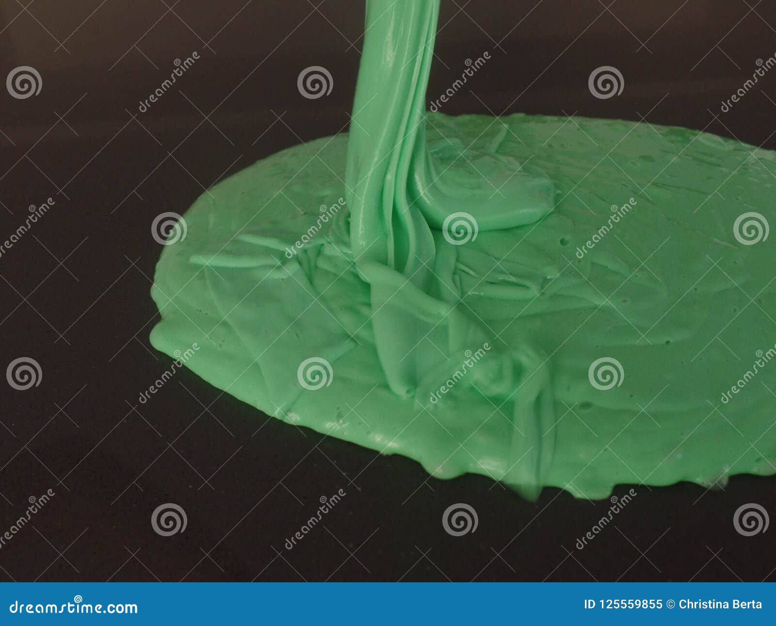 Creating Patterns Out of Bright Green Slime Stock Image - Image of ...