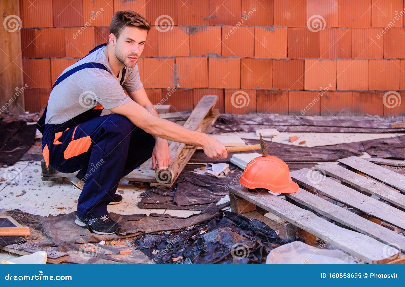 Creating Solid Foundation. Worker Brick Wall Background. Building and ...