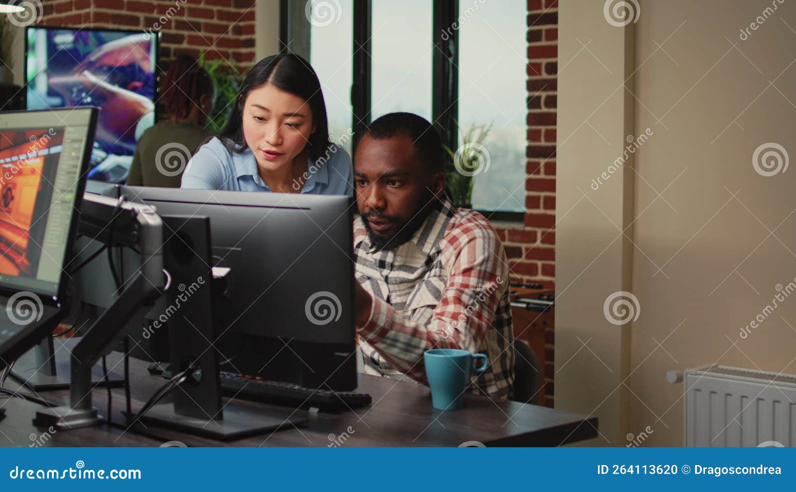Creative Agency Employees Using Computers To Develop New Graphics ...