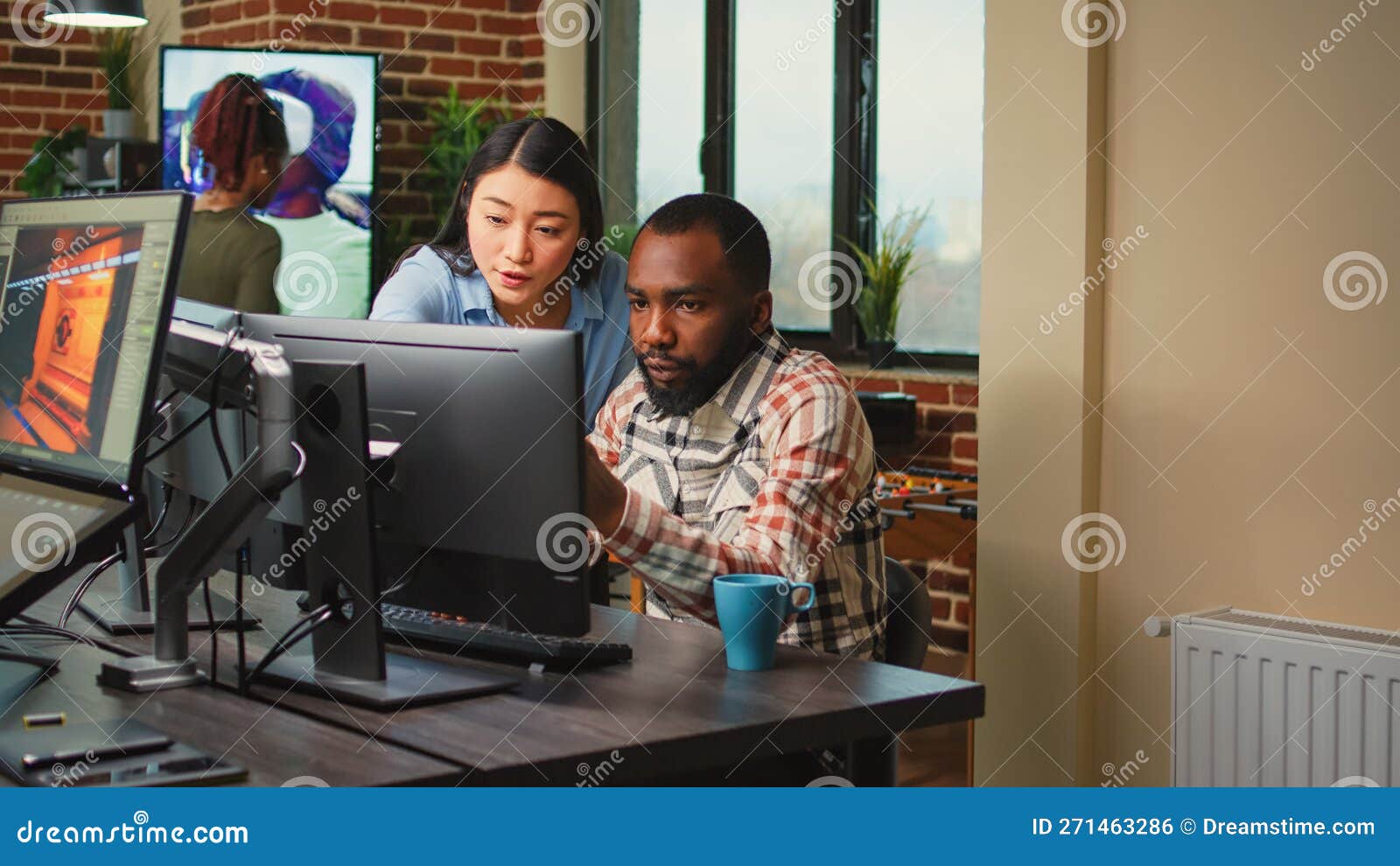 Creative Agency Employees Using Computers To Develop New Graphics ...