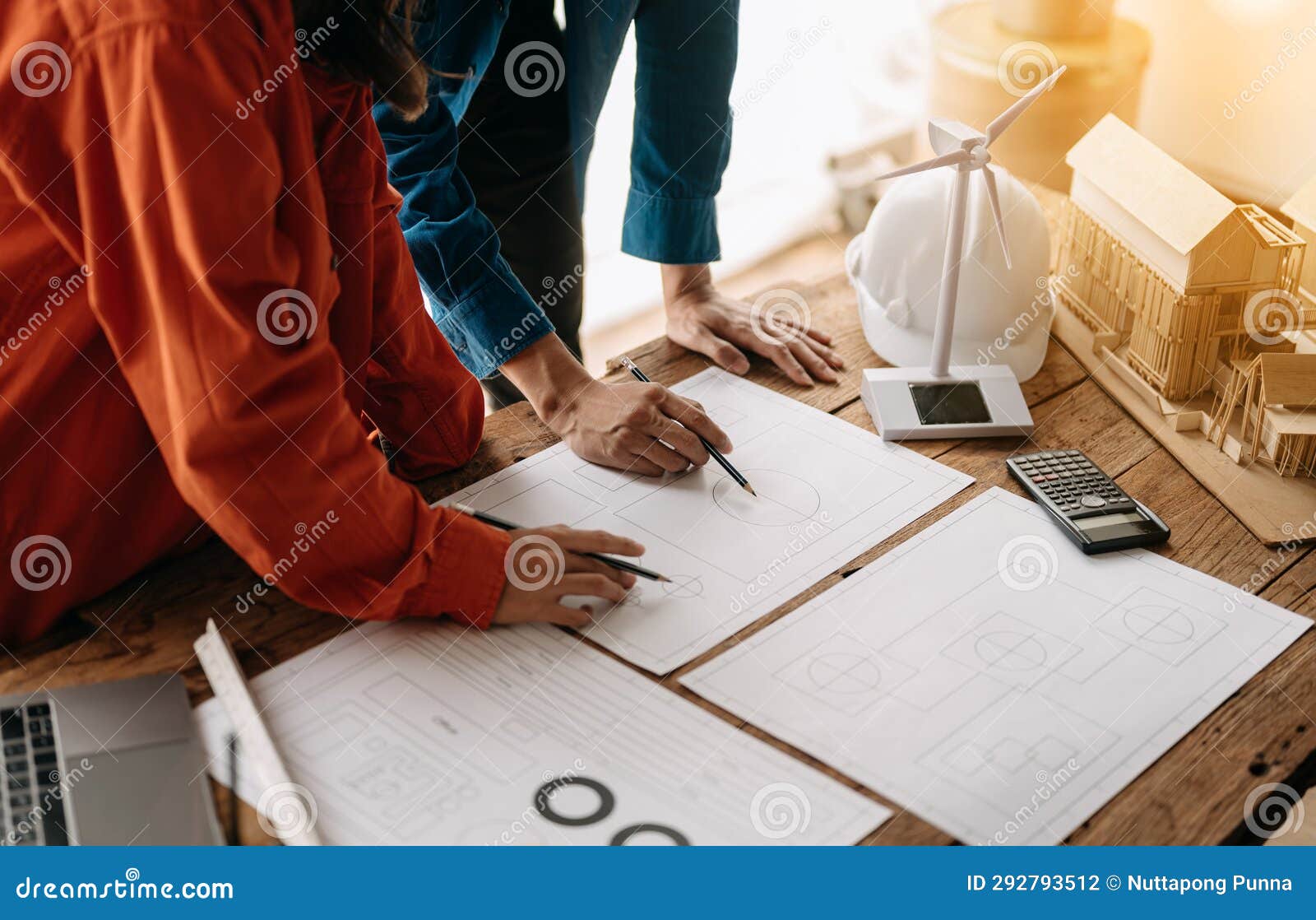 Creative Architect Projecting on the Big Drawings in the Dark Loft ...