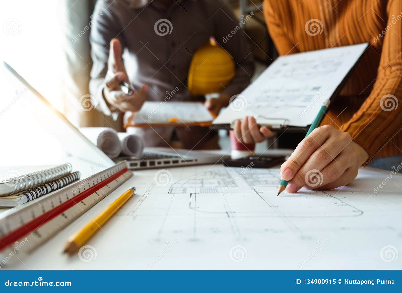 Creative Architect Projecting on the Big Drawings in the Dark Loft ...