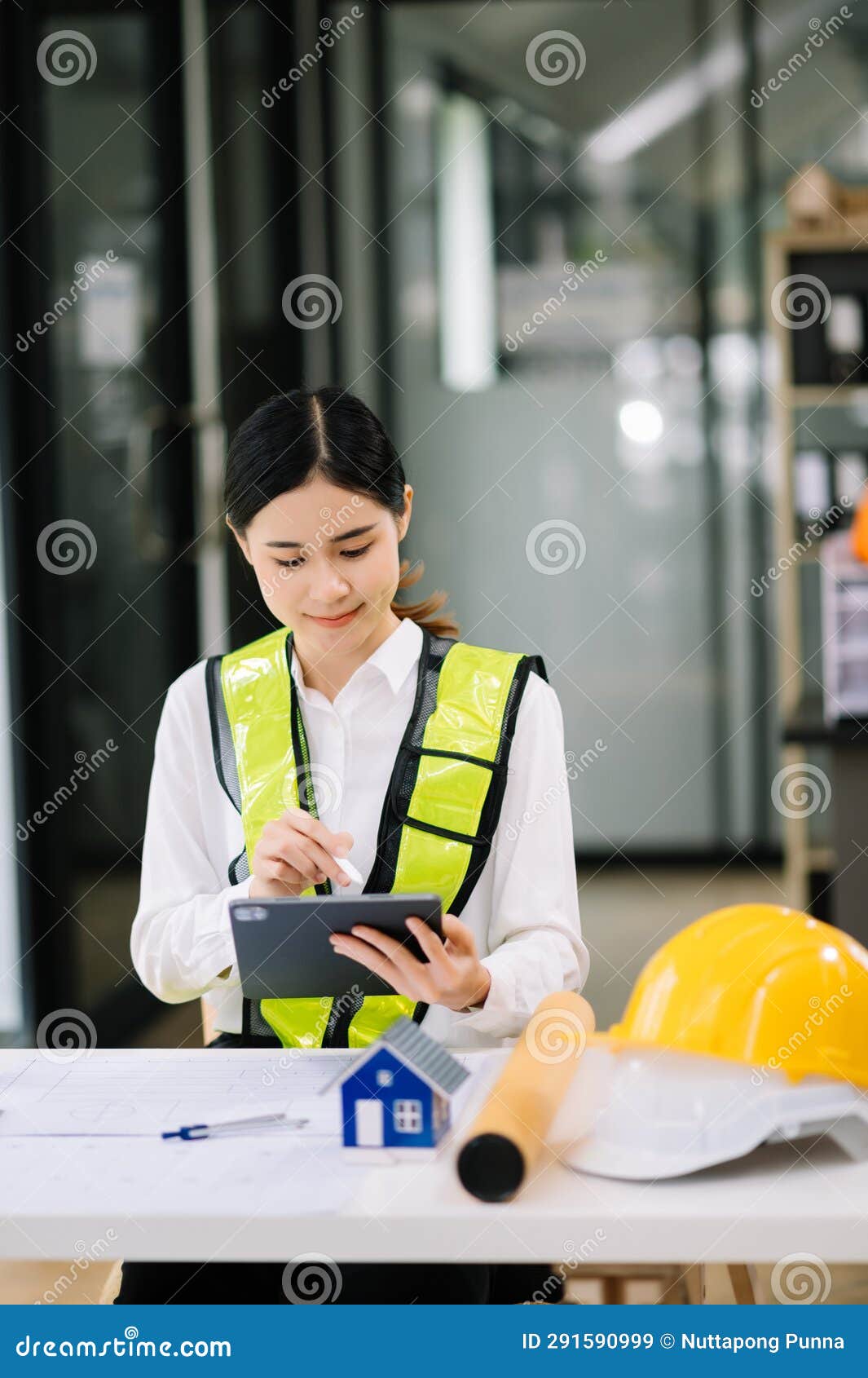 Creative Architect Projecting on the Big Drawings Working and Laptop ...