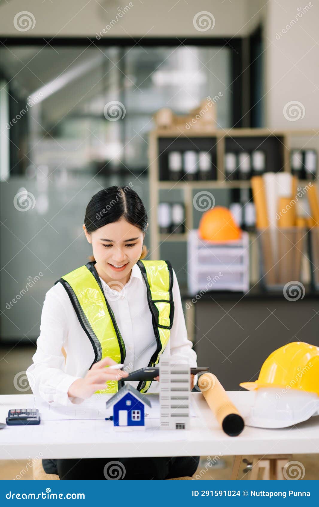 Creative Architect Projecting on the Big Drawings Working and Laptop ...
