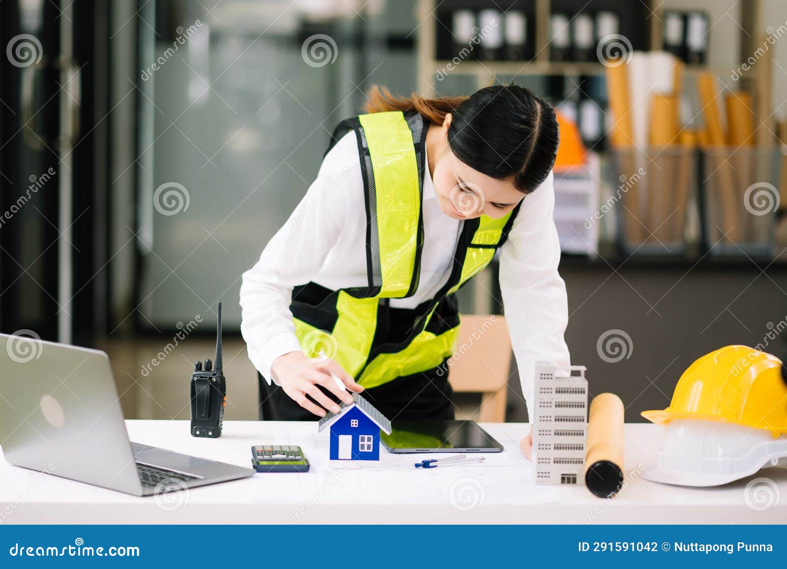 Creative Architect Projecting on the Big Drawings Working and Laptop ...