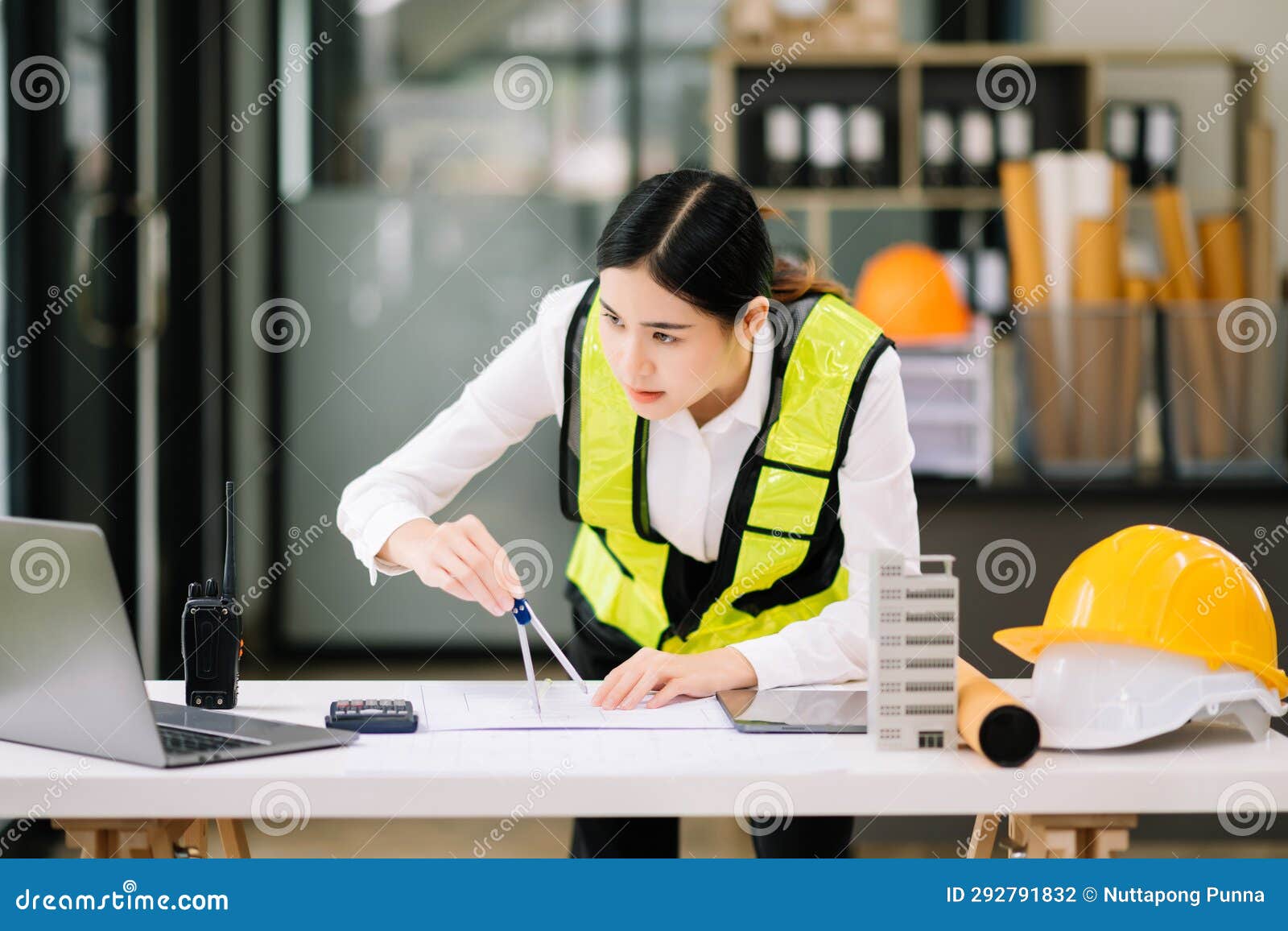 Creative Architect Projecting on the Big Drawings Working and Laptop ...