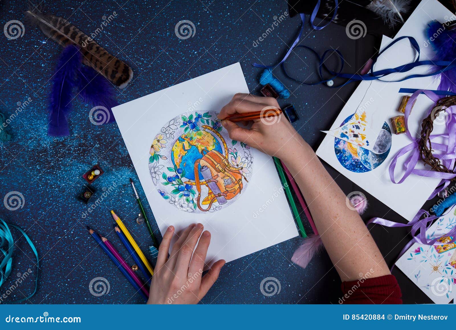 Creative Atmosphere in Which a Person is Engaged Drawing Sketches ...