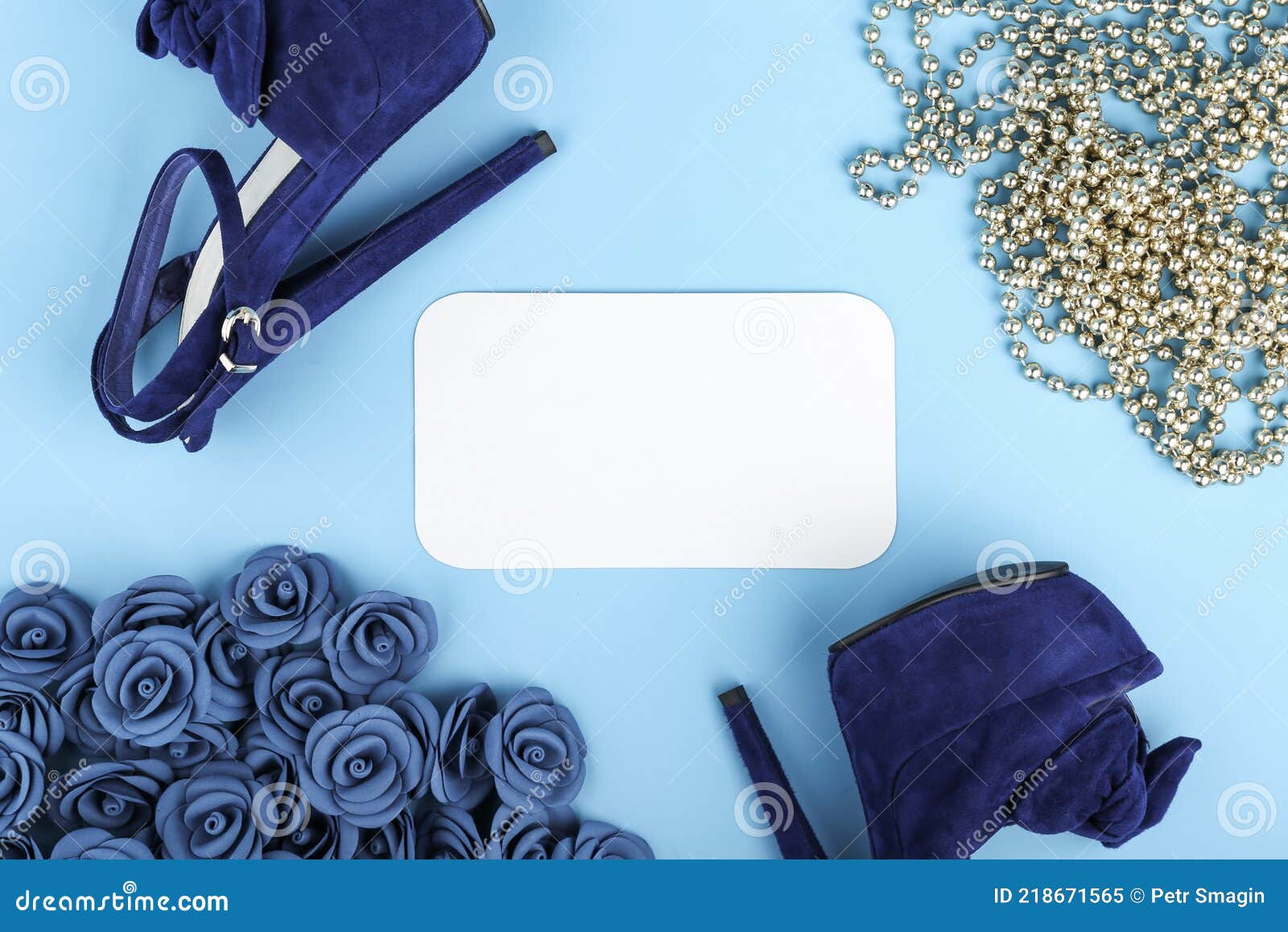Creative Backdrop with High Heels Shoes and Accessories on Blue ...
