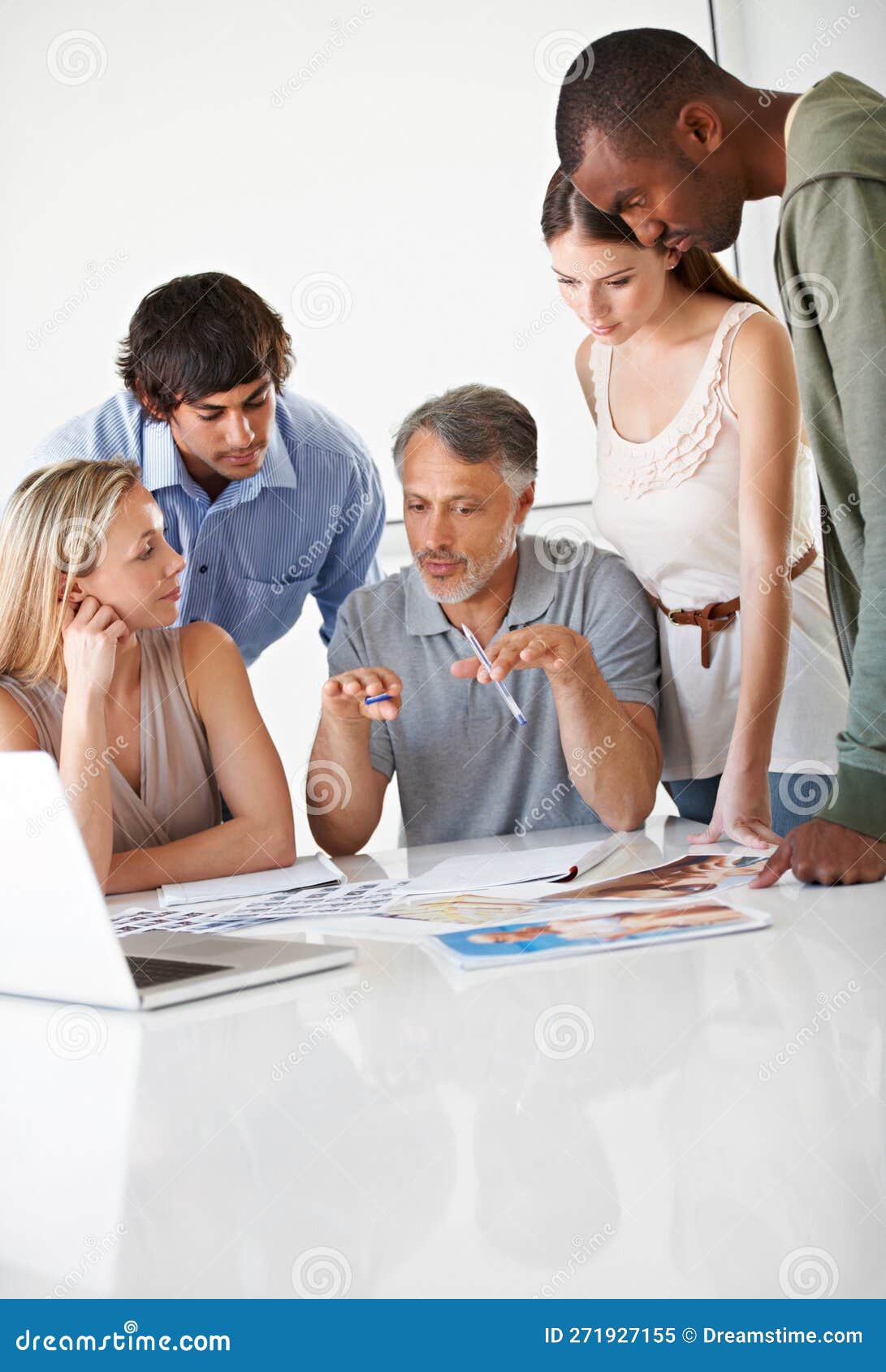 Creative Brainsorming. Five Colleagues Working on an Exciting Project ...