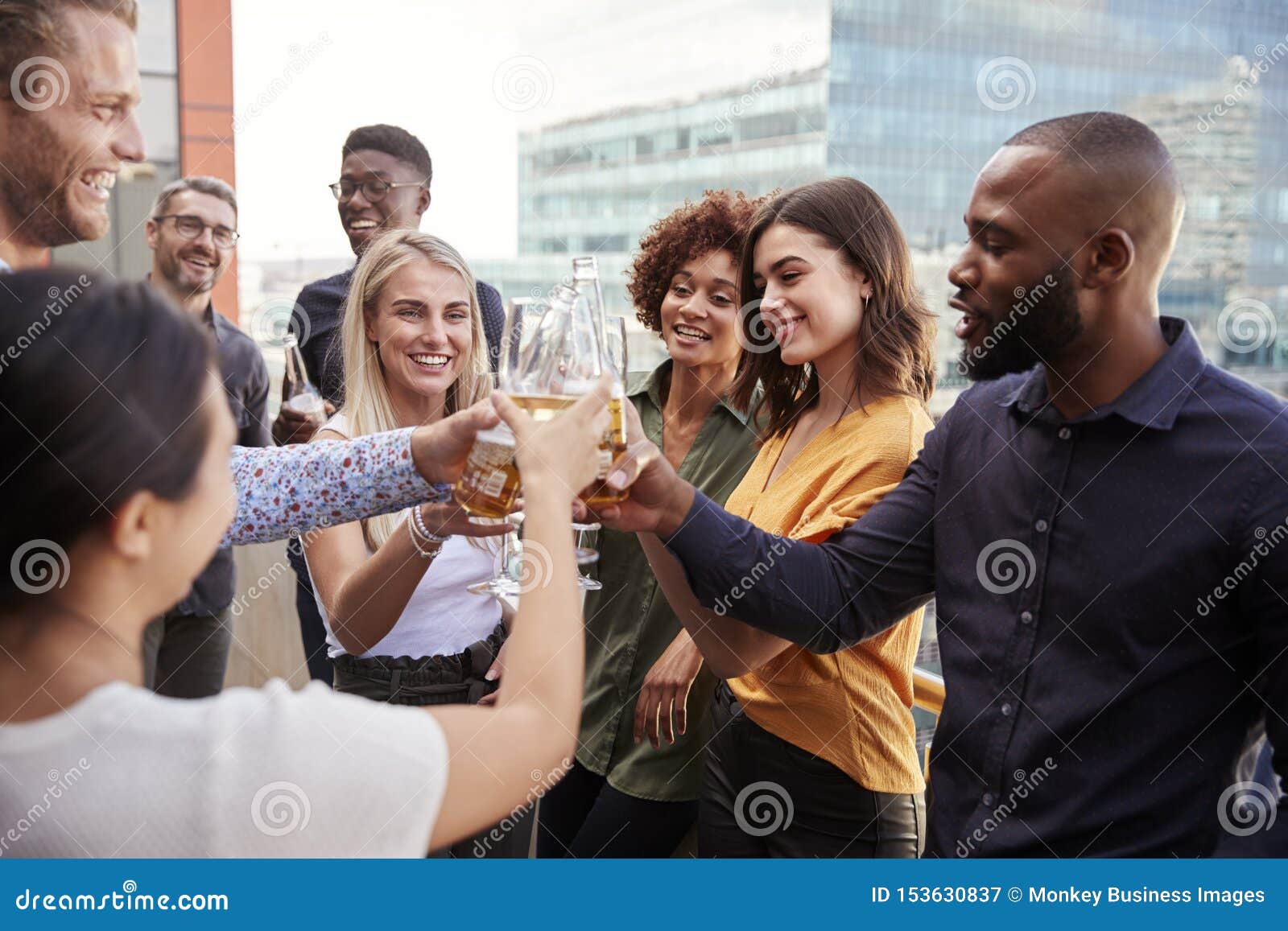 Creative Business Colleagues Raising Glasses and Making a Toast with ...