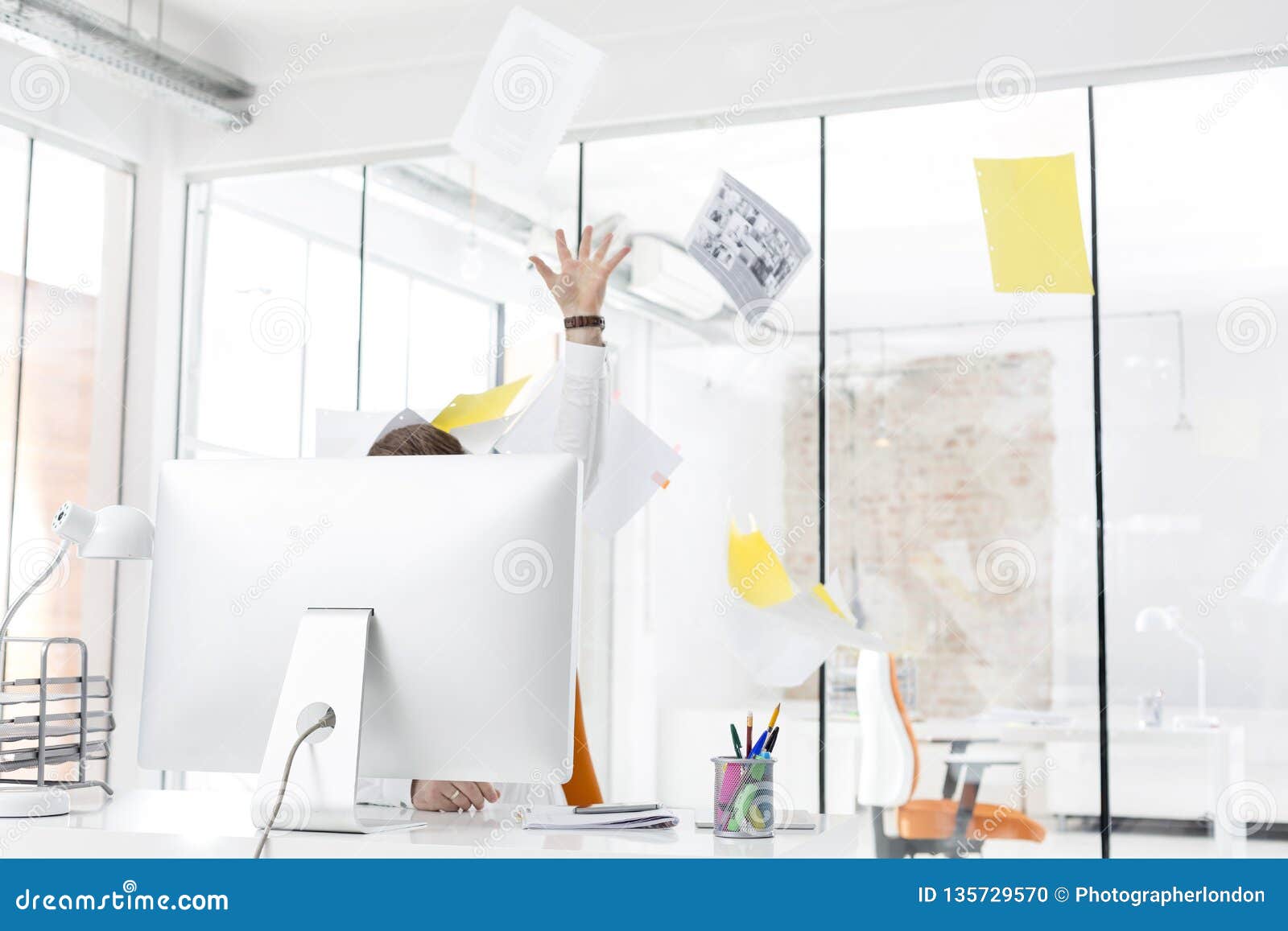 Furious Businessman Throwing Documents at Computer Desk in Office Stock ...