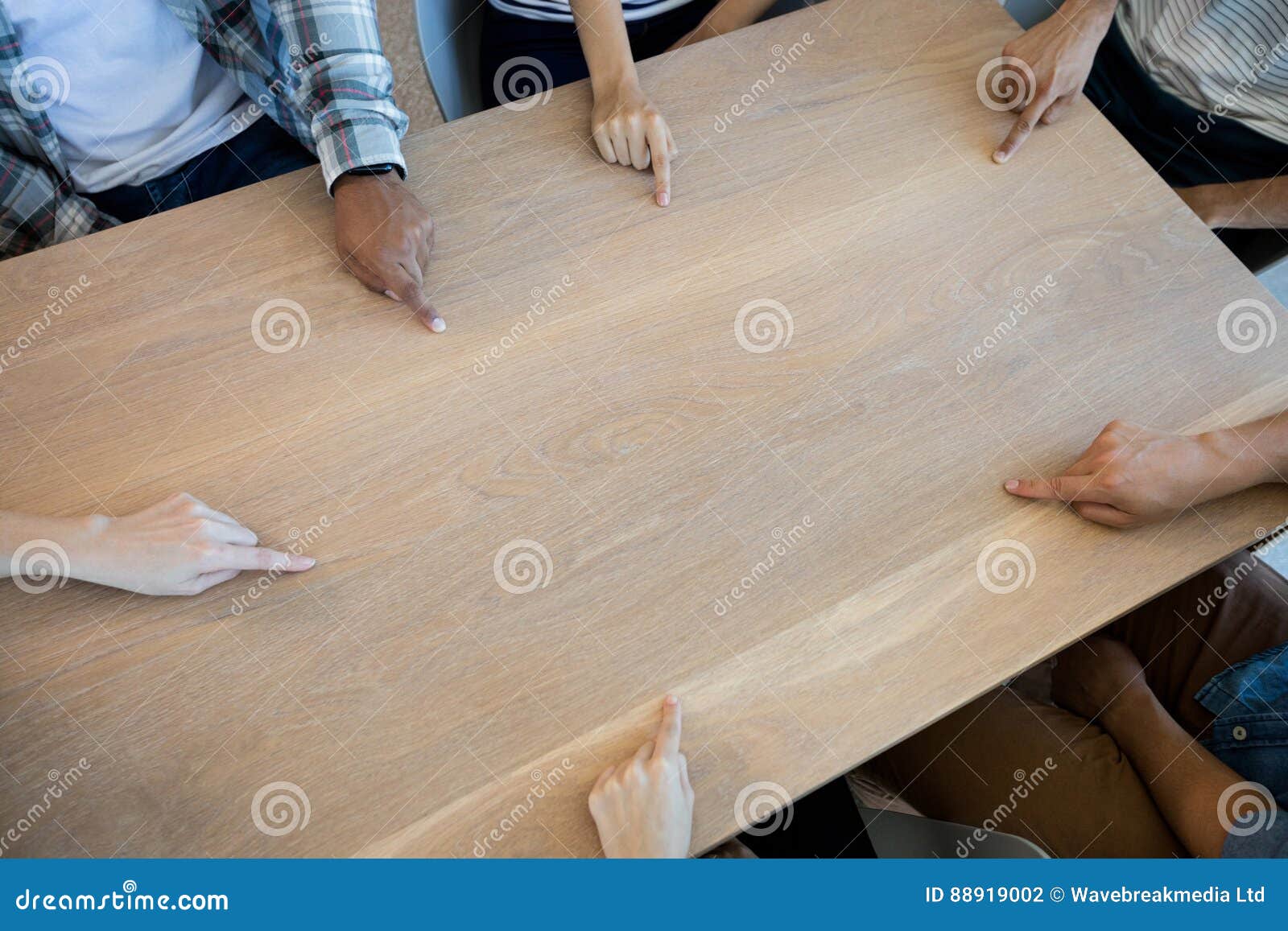 Creative Business Team Pointing To a Blank Copy Space on Table Stock ...