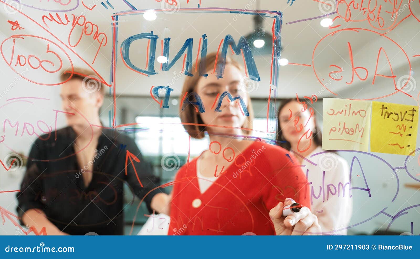 Creative Business Team Sharing Idea, Writing Down on Sticky Note ...