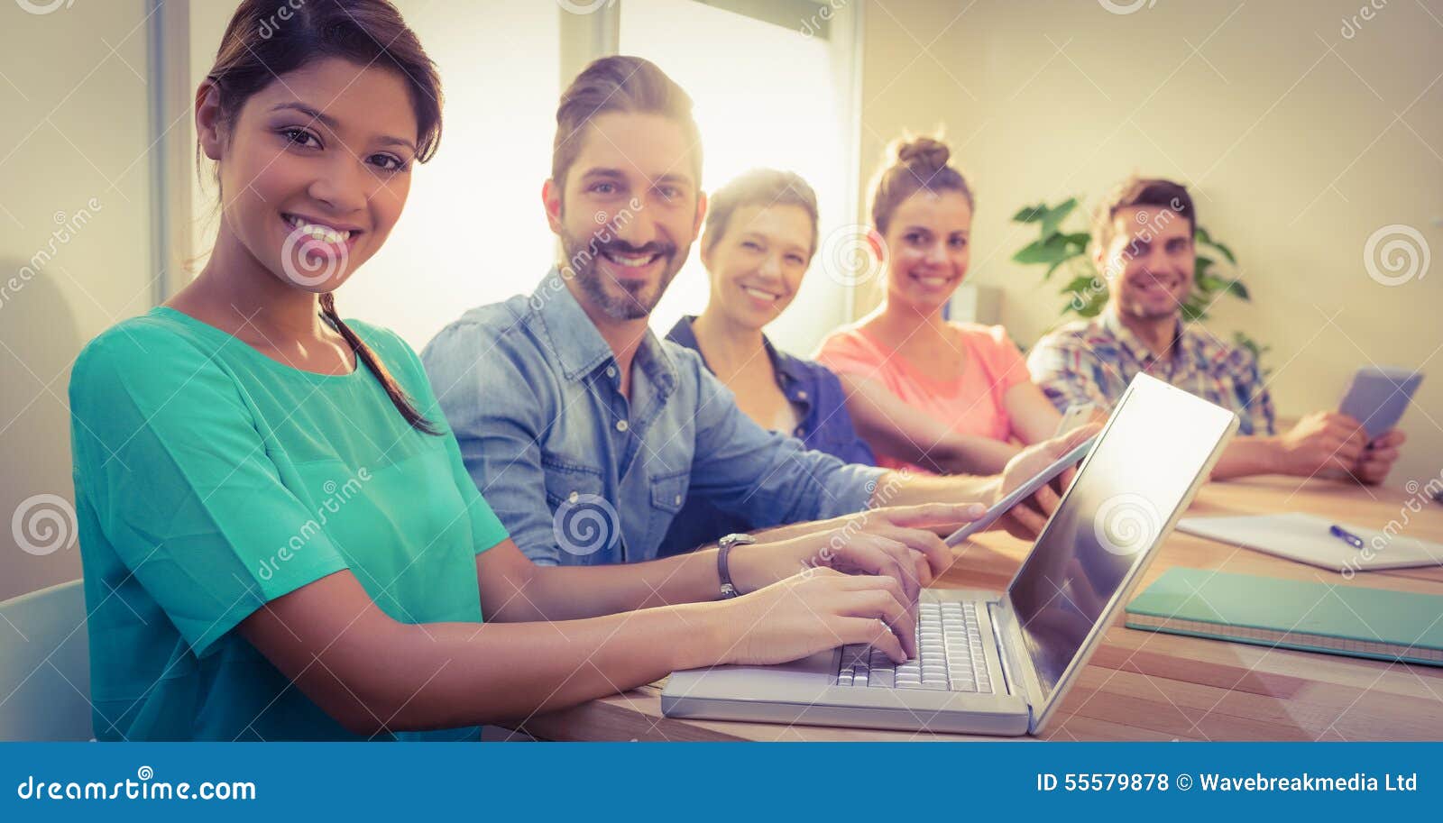 Creative Business Team Smiling at Camera Stock Photo - Image of ...