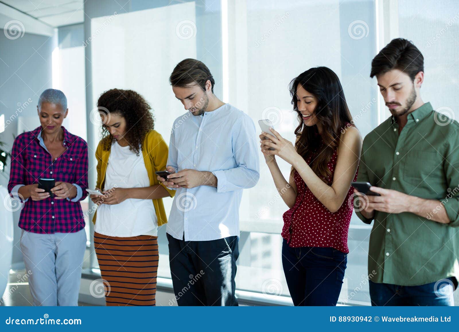 Creative Business Team Using Mobile Phone in Office Stock Photo - Image ...