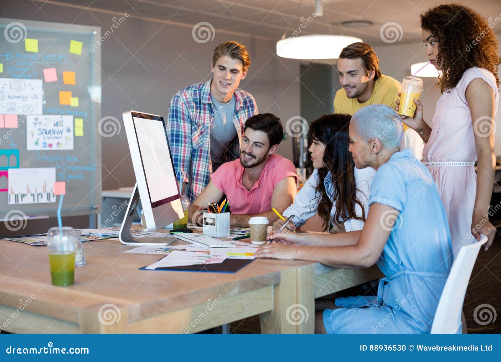 Creative Business Team Working Together on Desktop Pc Stock Photo ...