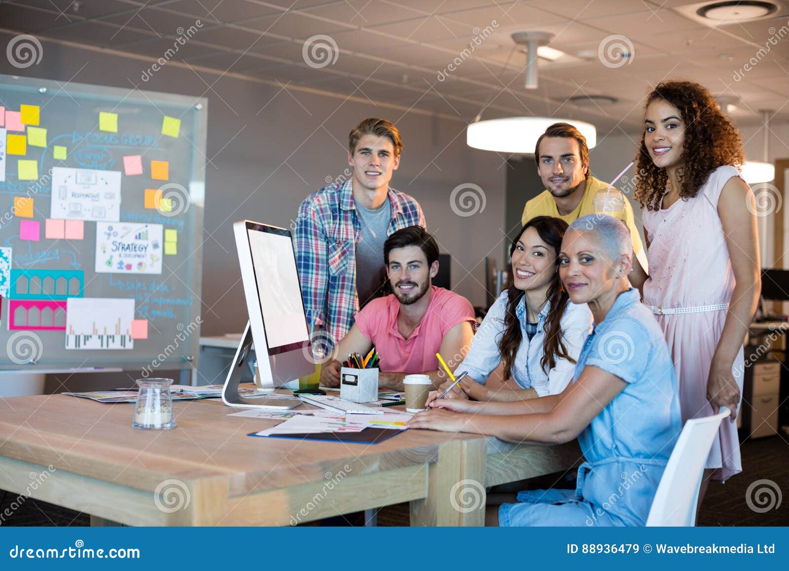 Creative Business Team Working Together on Desktop Pc in Office Stock ...