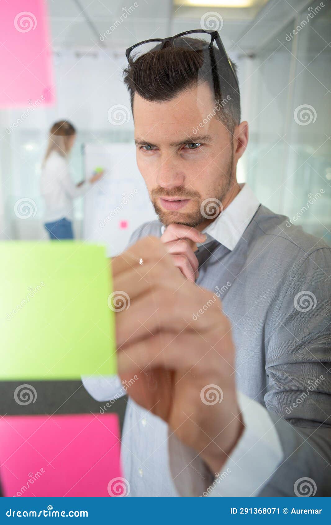 Creative Businessman Writing Notes on Paper in Office Stock Image ...