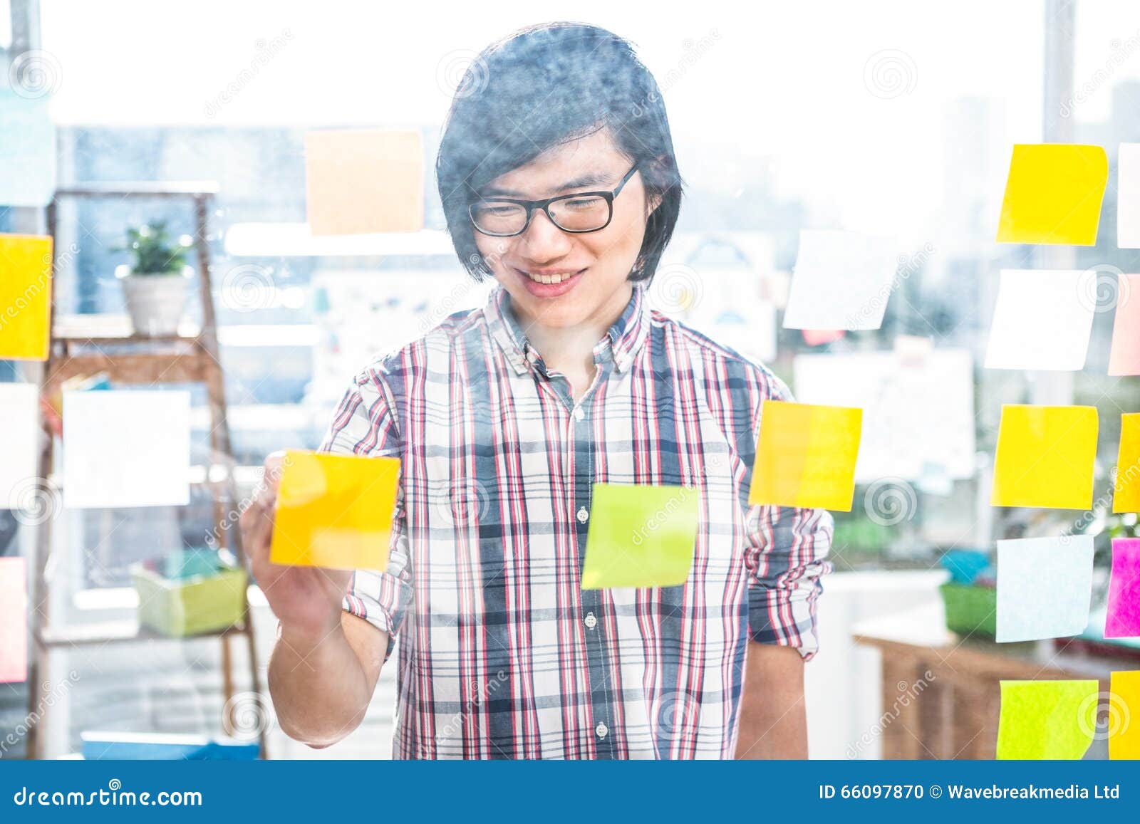 Creative Businessman Writing on Sticky Notes Stock Photo - Image of ...
