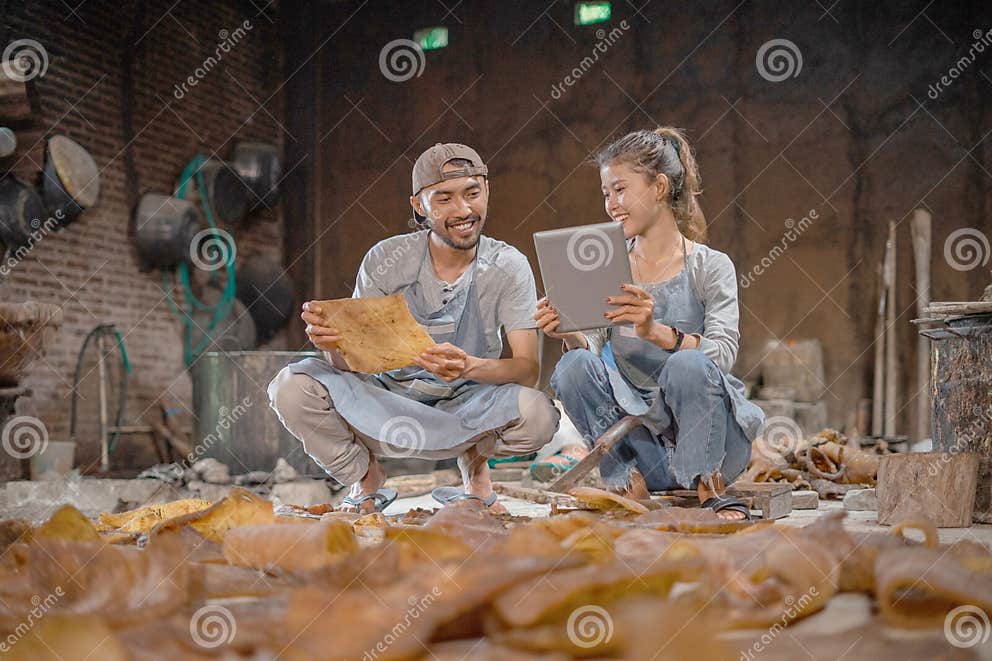 Creative Collaboration: Artisans Working Together in a Workshop Setting ...