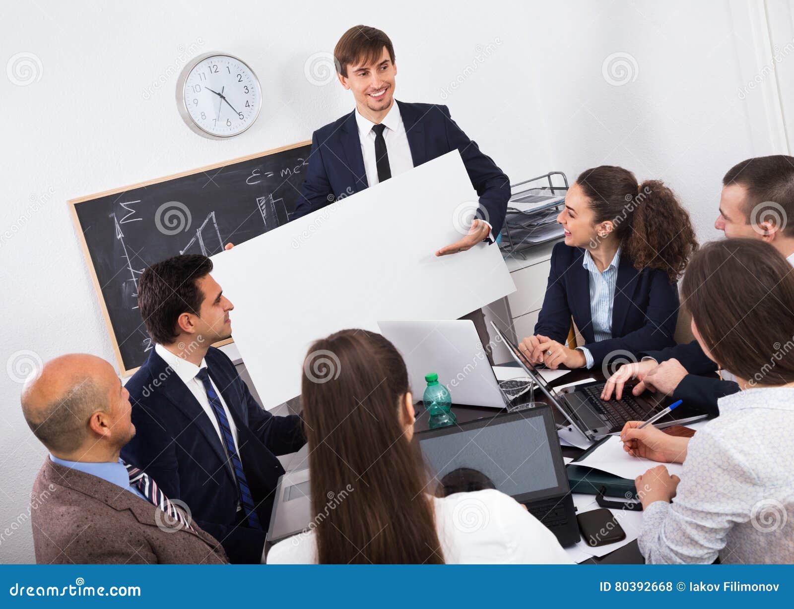 Creative Colleagues Discussing New Development Plan at Poster Stock ...