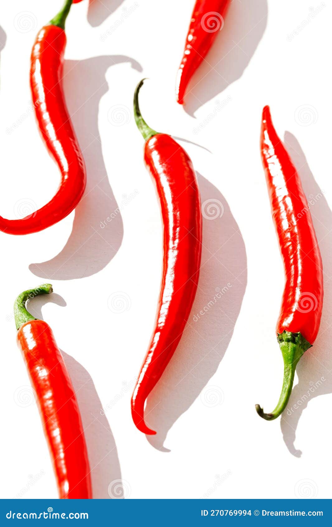 Creative Composition Made of Red Chilli Peppers on White Sunlit ...