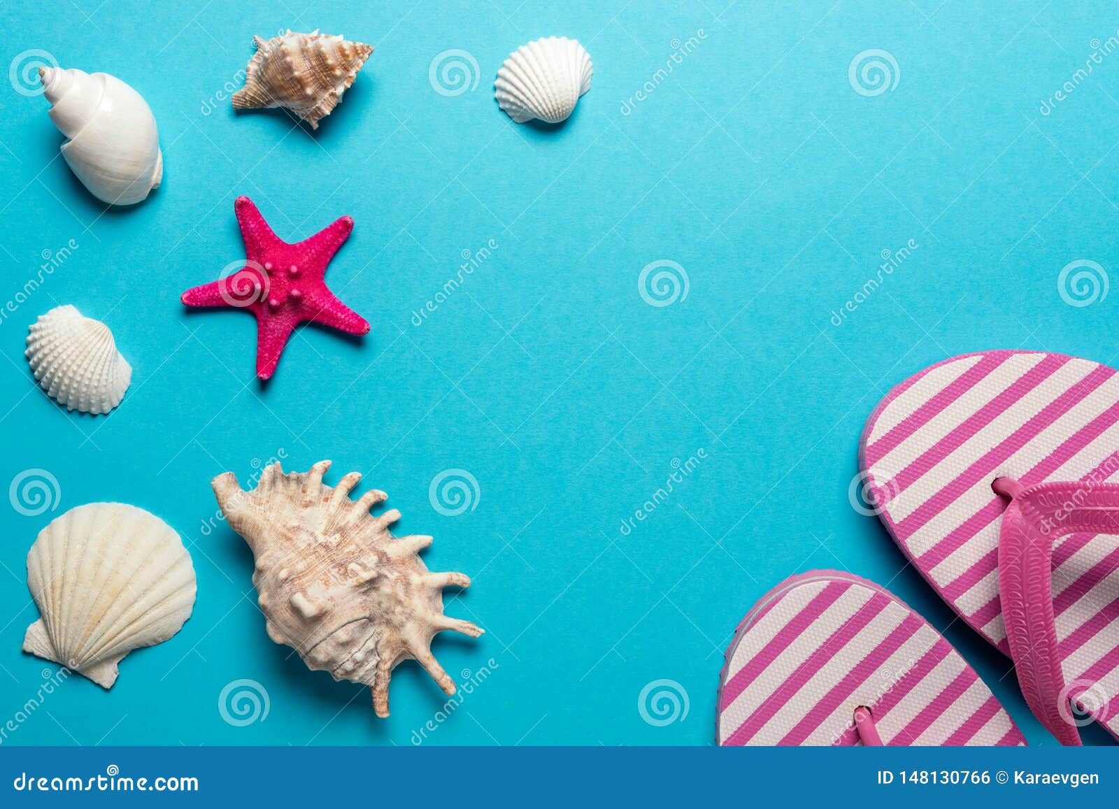 Creative Composition with Seashells and Beach Slippers on Blue ...