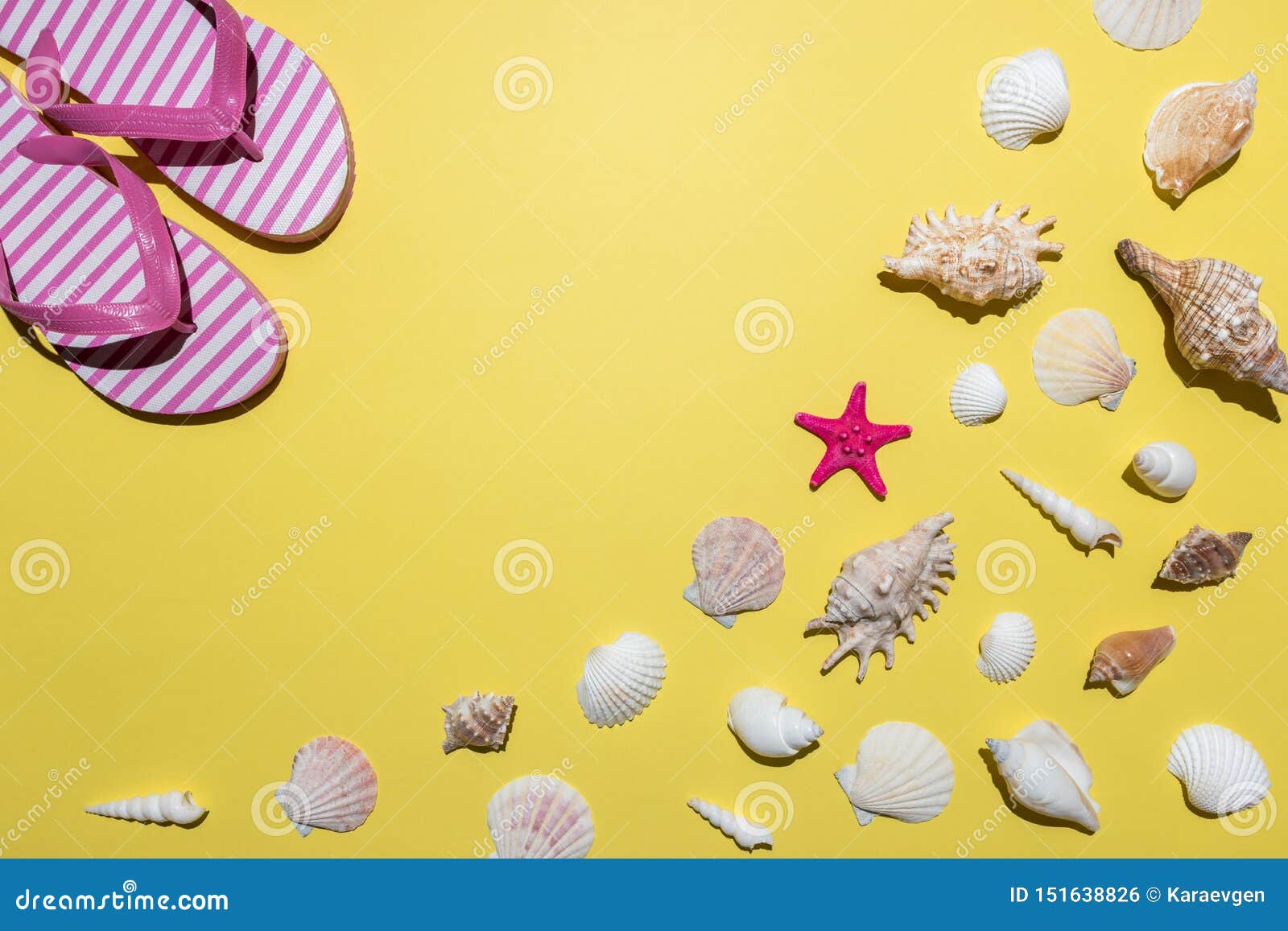 Creative Composition with Seashells and Beach Slippers on Bright Yellow ...