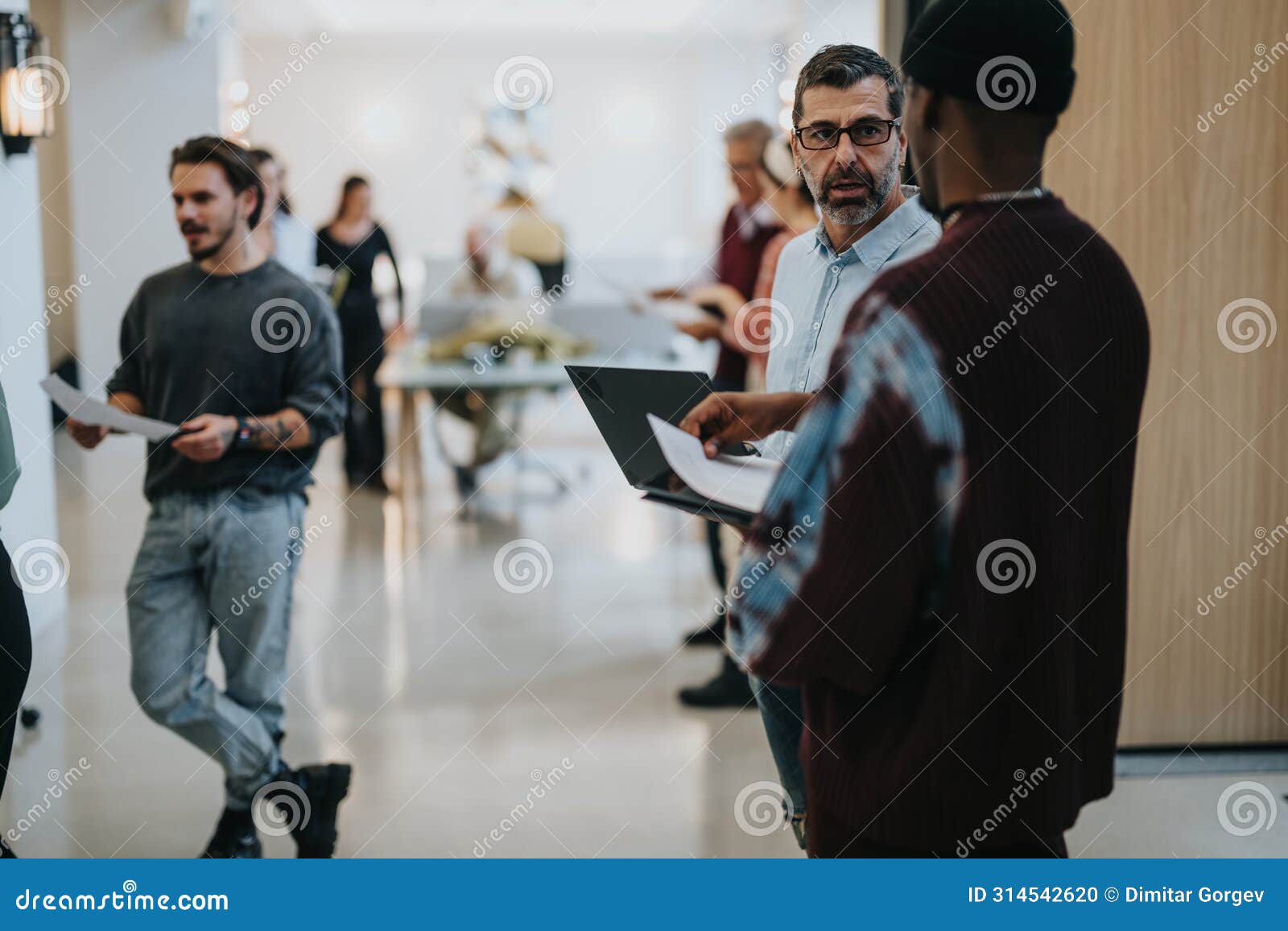 Creative, Different Aged People Networking in Modern Office Space ...