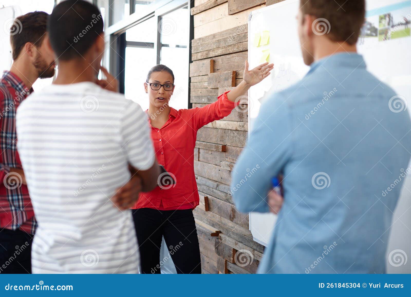 Creative Discussions. a Group of Designers Discussing Ideas in a ...