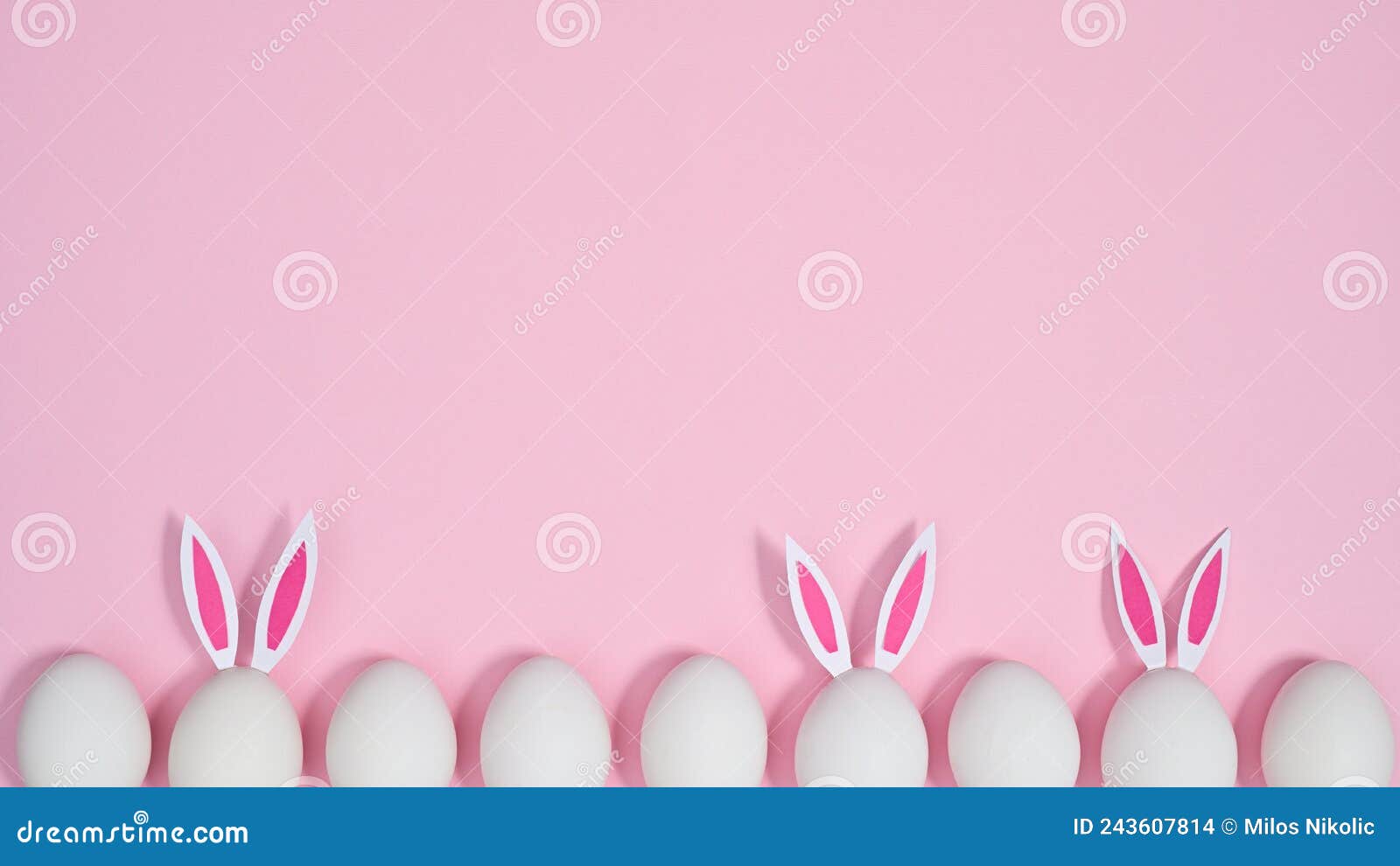 Creative Easter Copy Space Background with Eggs with Bunny Ears on ...