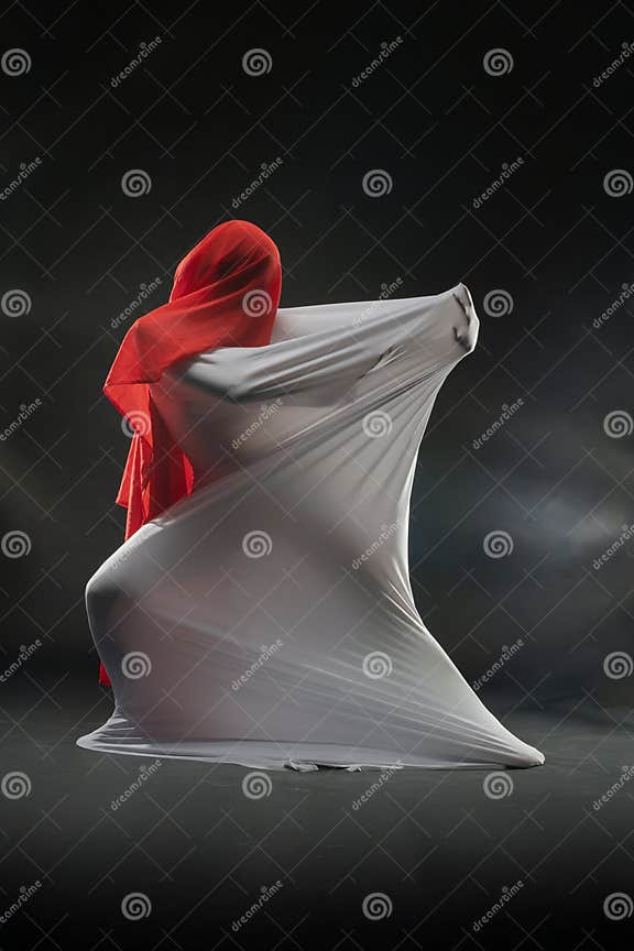 Creative Fabric Art Performance with Flowing Materials in a Studio ...